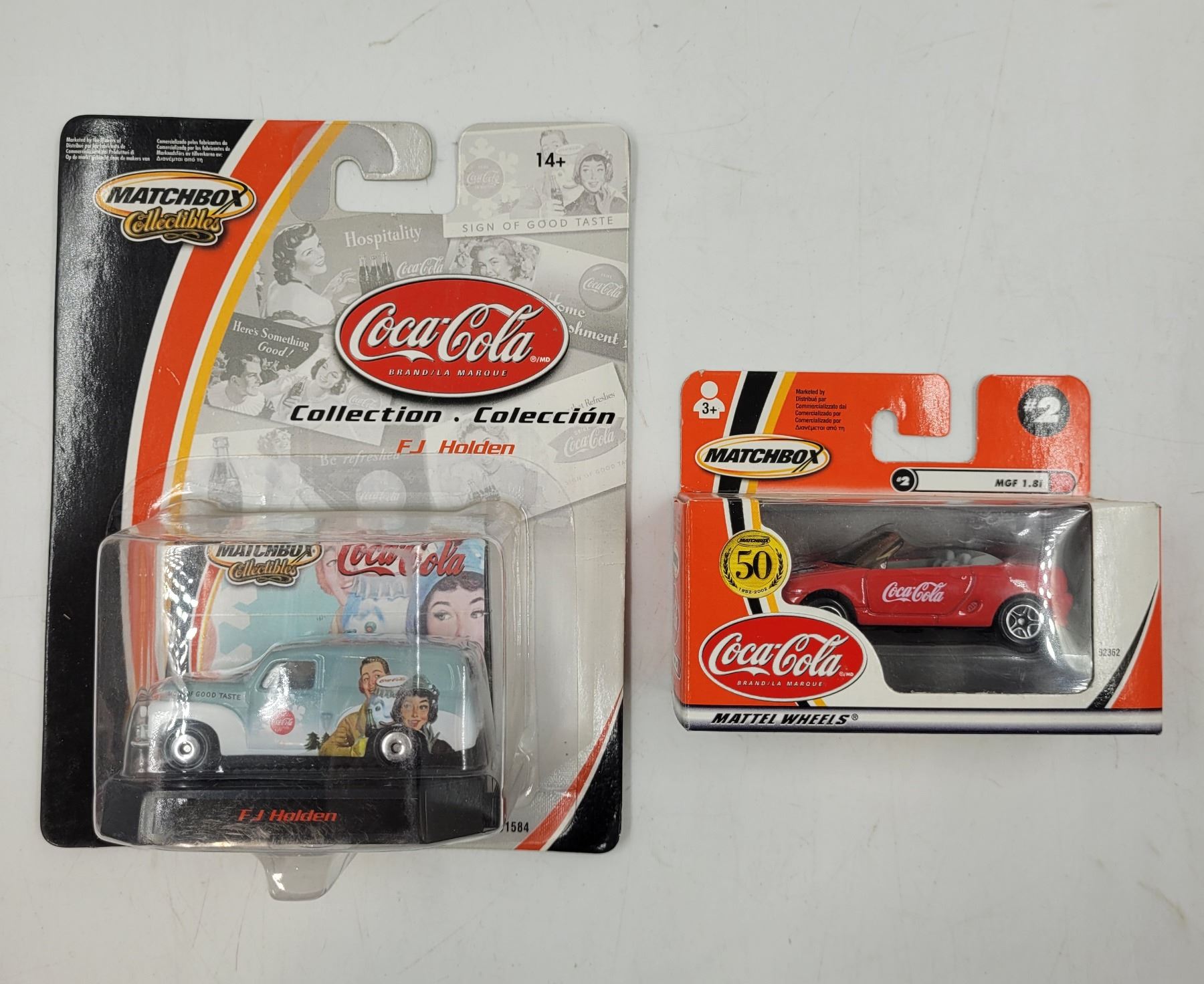 2 Sealed Matchbox Coca Cola diecast Holden & Convertible