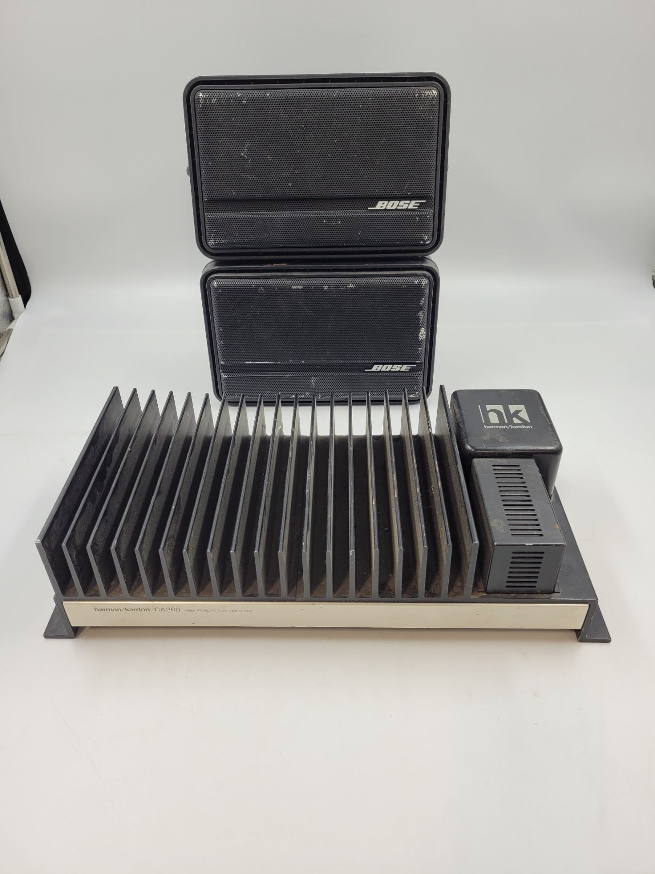 Harman/Kardon High Fidelity Car Amplifier and 2 Bose Speakers