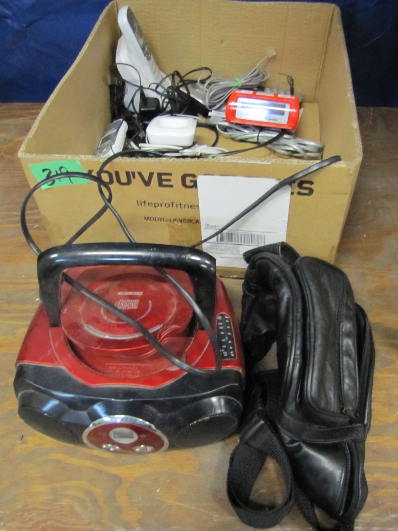 Radio CD player , telephones , fanny pack , Pioneer DVD player - not tested