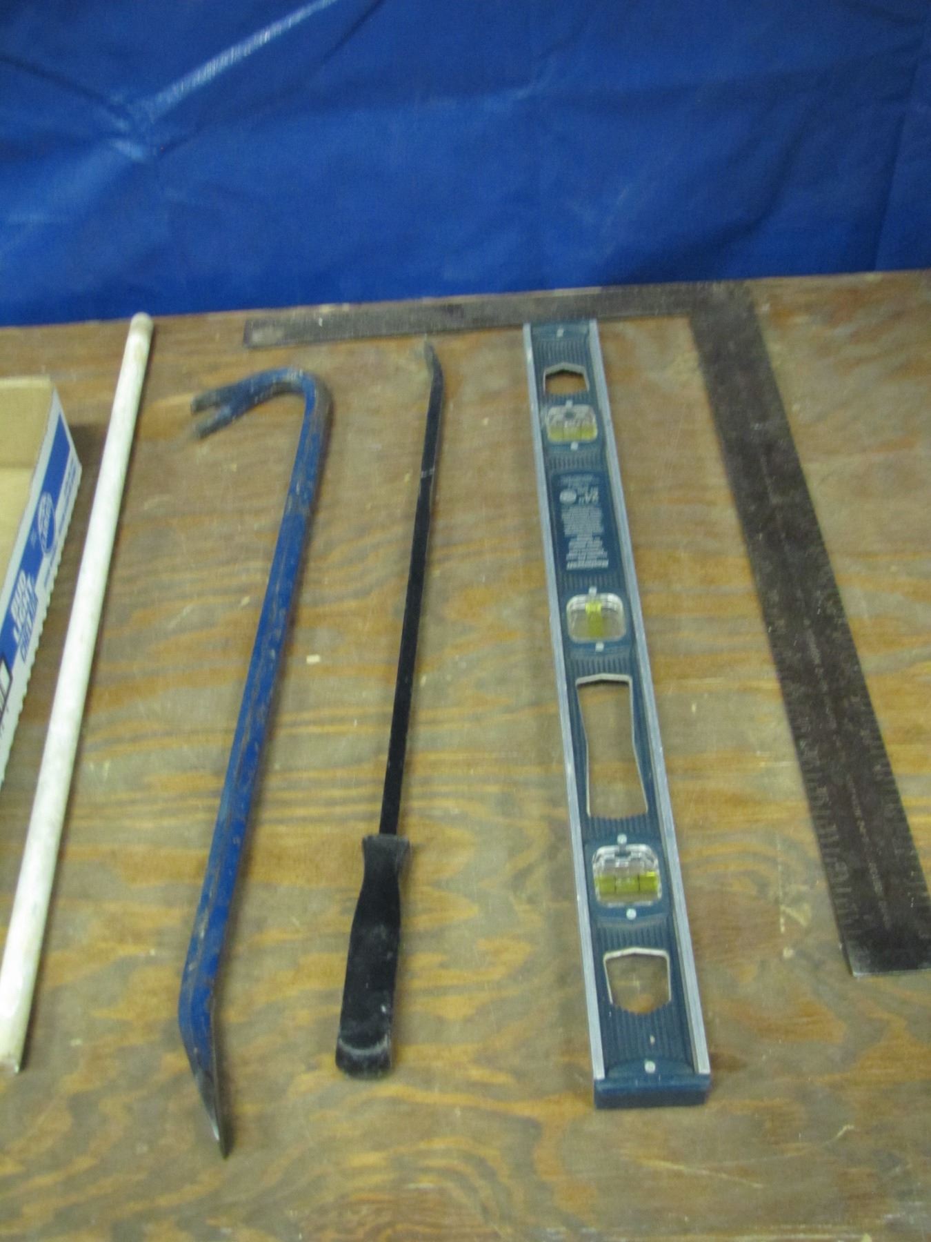 24 inch level , steel square , crowbar, pry bar