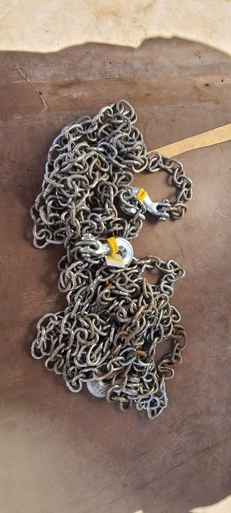 TWO LONG SMALL CHAINS