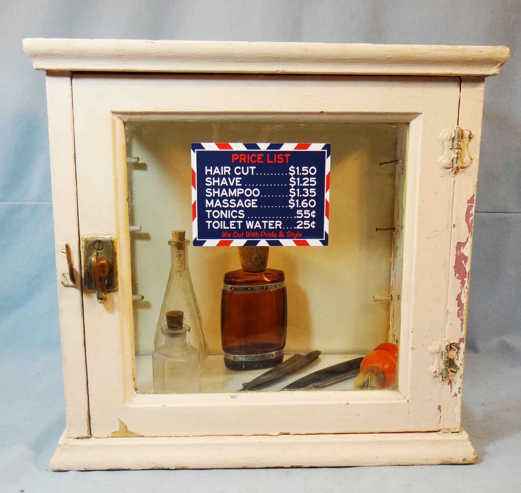 Antique barber cabinet with (3) vintage bottles, (2) blades and (1 ...