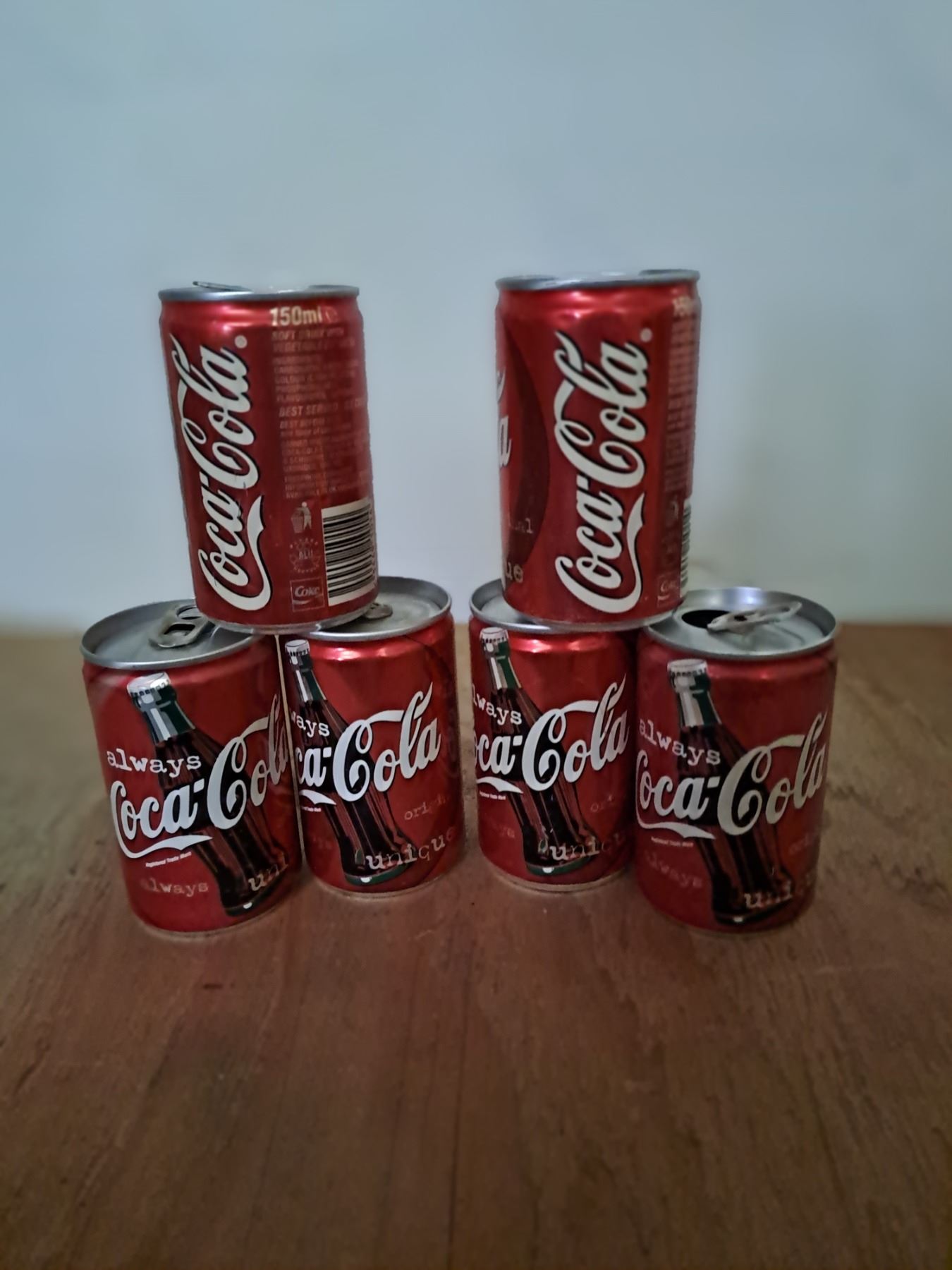 Six mini 1996 Coca Cola tins