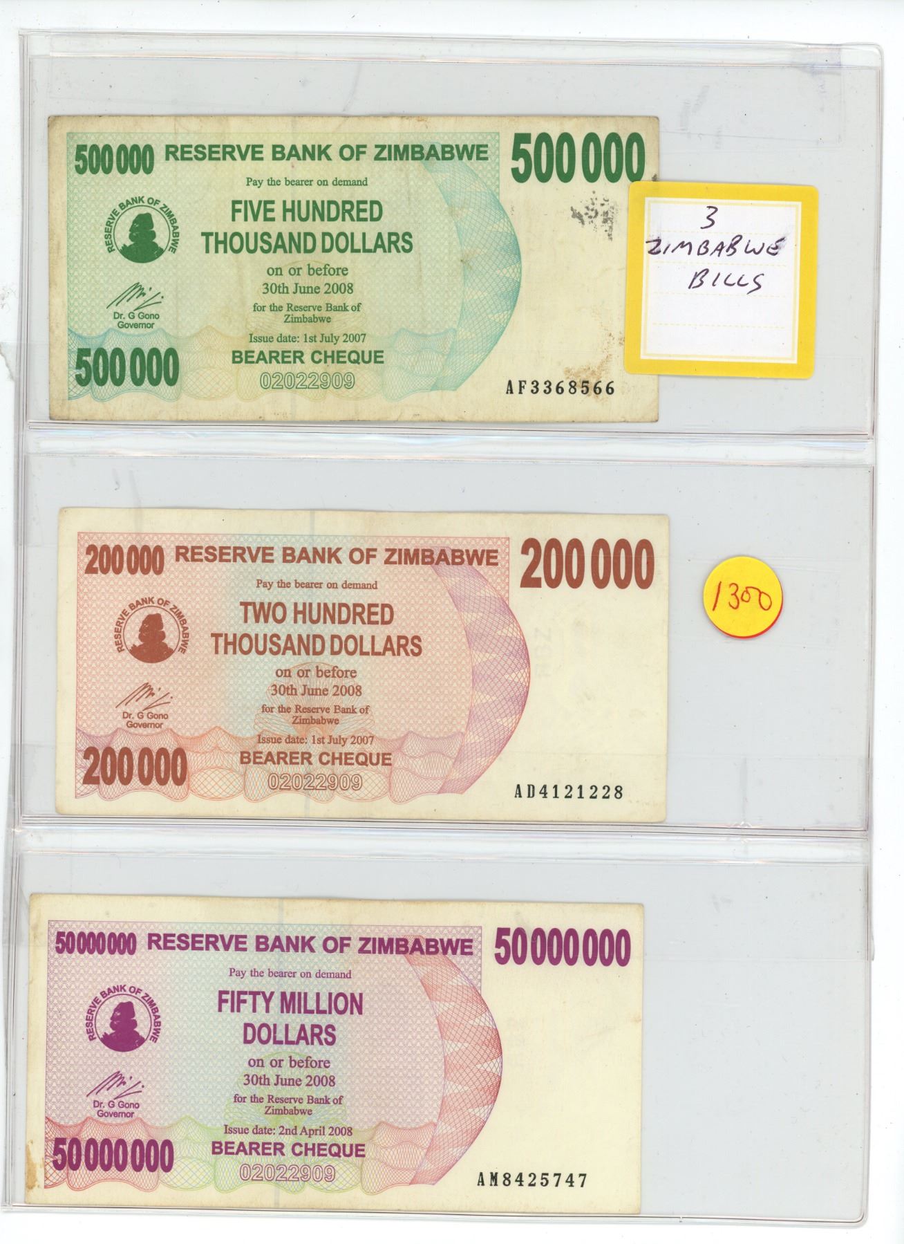 3 zimbabwe bills -$5000,000, $200,000 and $1,000,000