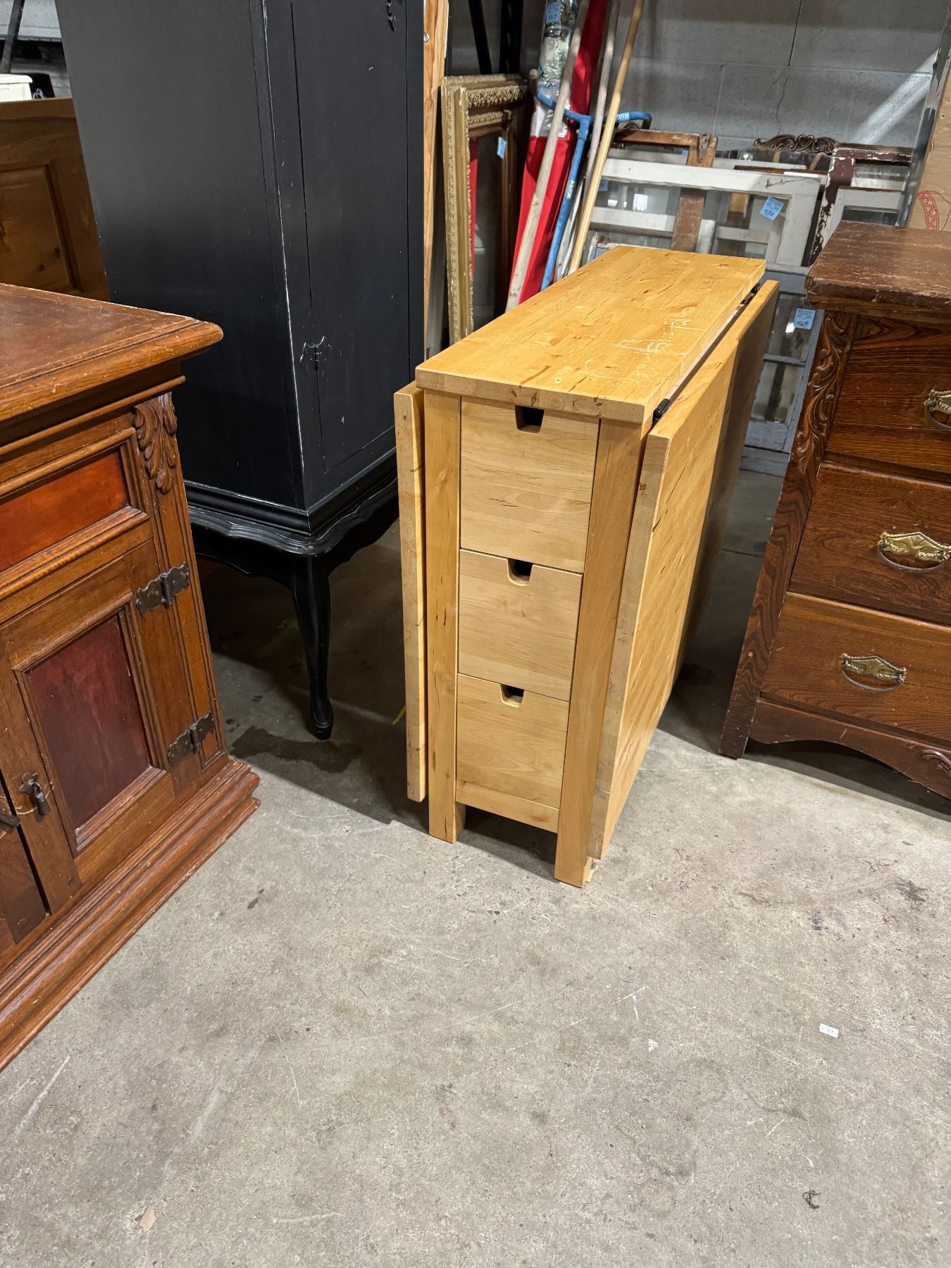 Folding table with drawers
