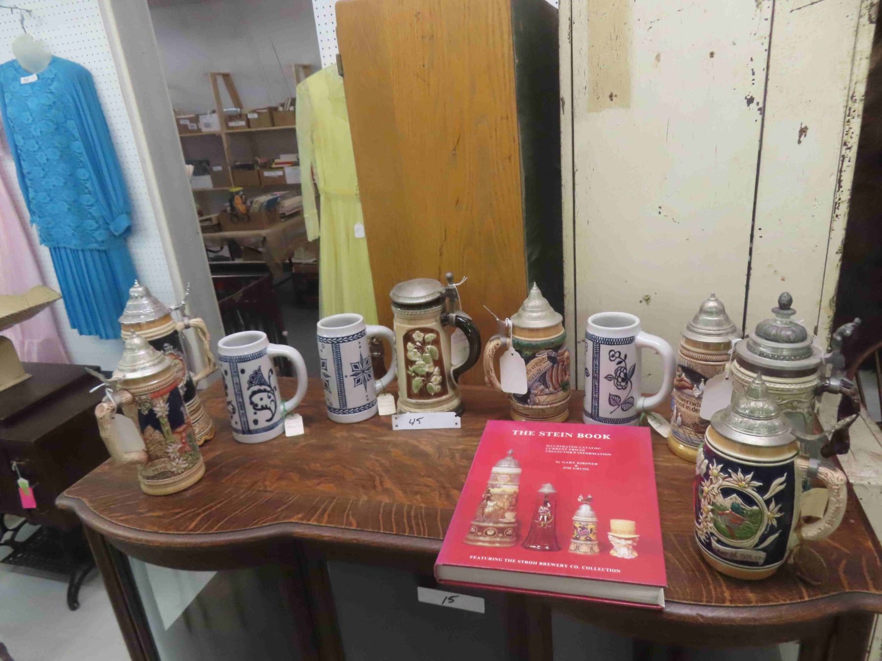10 Steins Including 1 Musical + Stein Book - McSherry Auction Service Ltd.