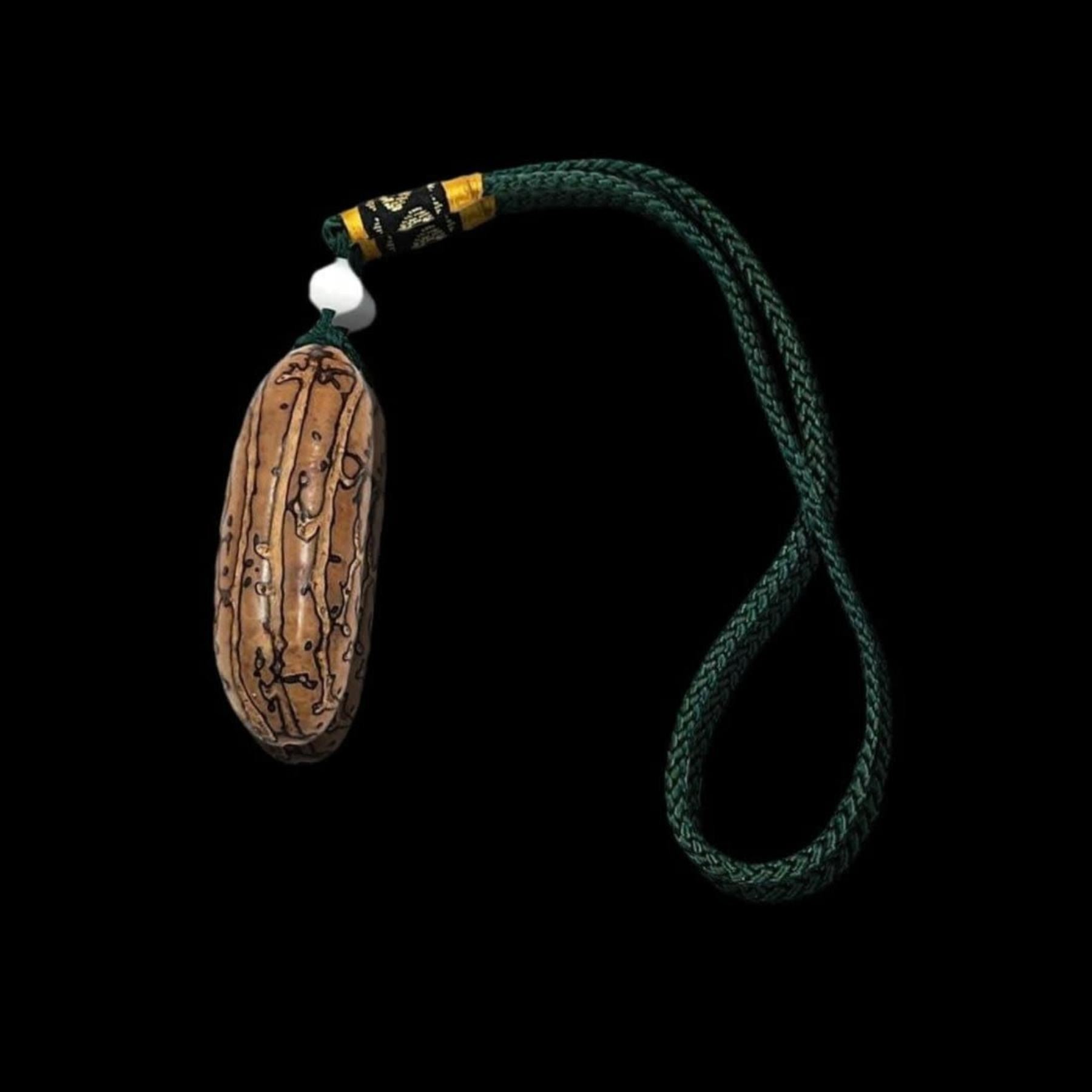 A Fine Chinese Pebble Pendant