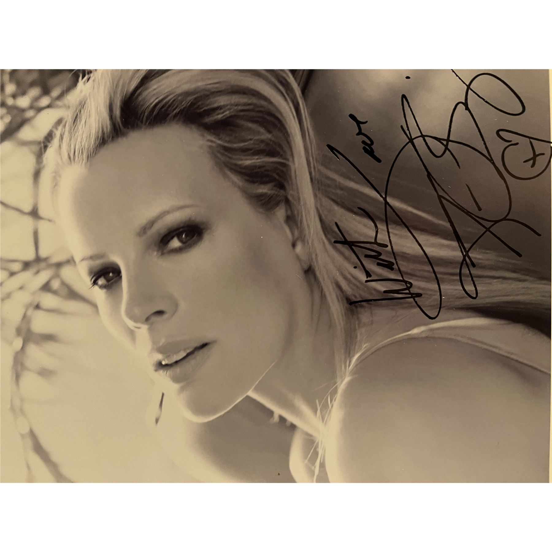 Kim Basinger facsimile signed photo. 8x10 inches