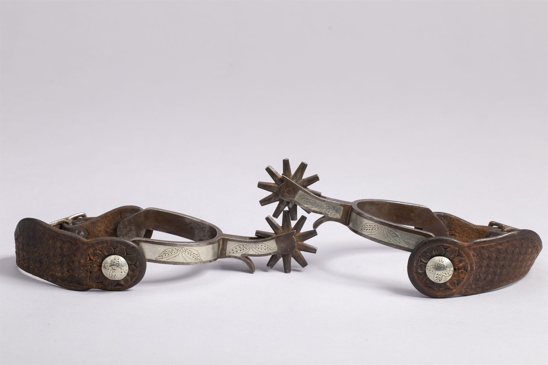 Canon City Double Mounted Spurs with Leaf Design