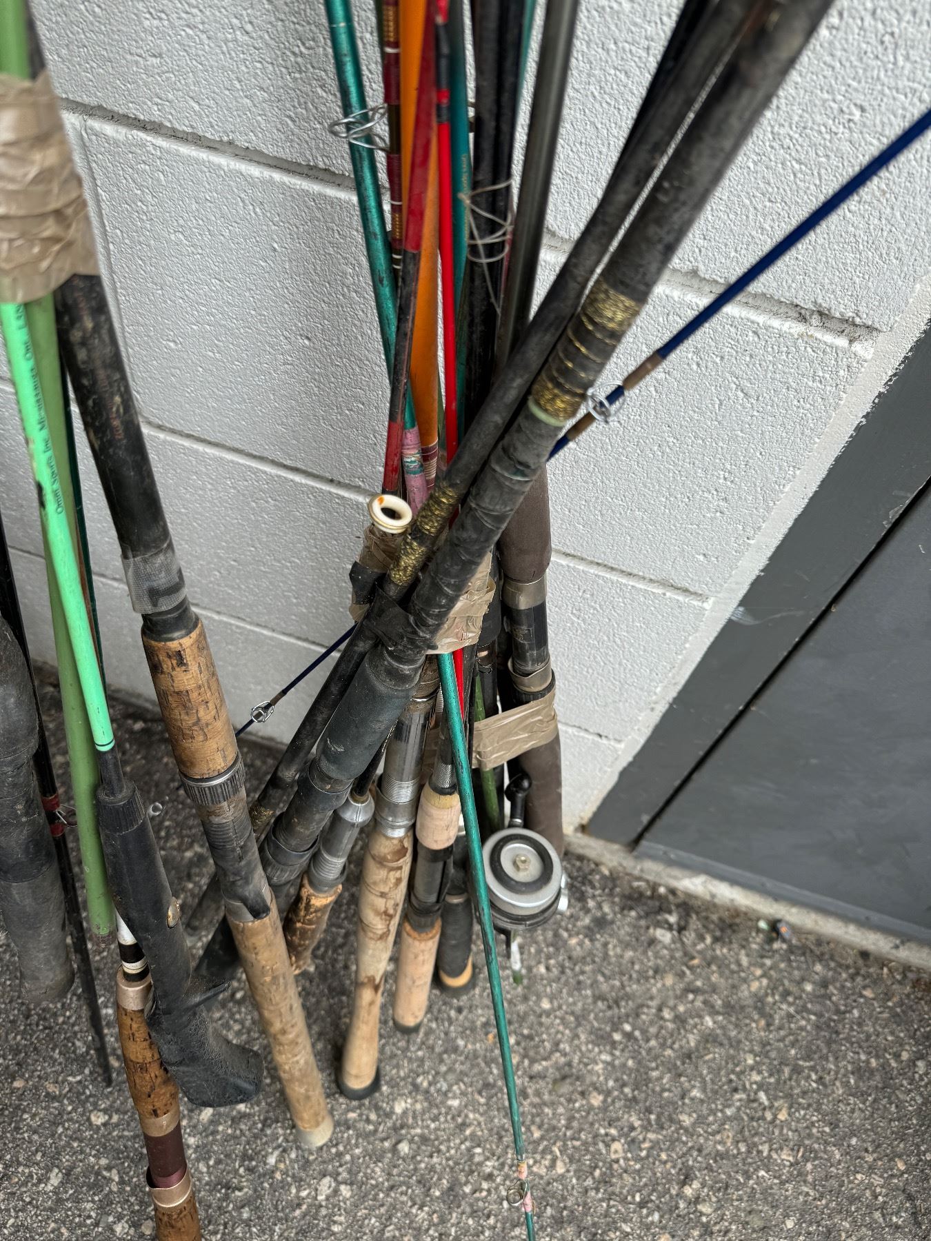 Large lot of fishing rods and cases