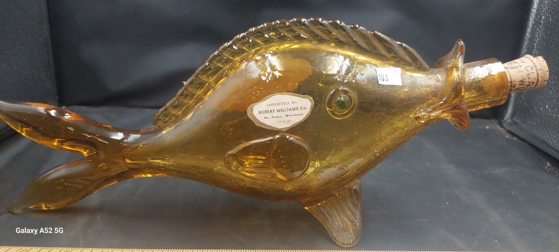 Vintage amber glass fish bottle 16"