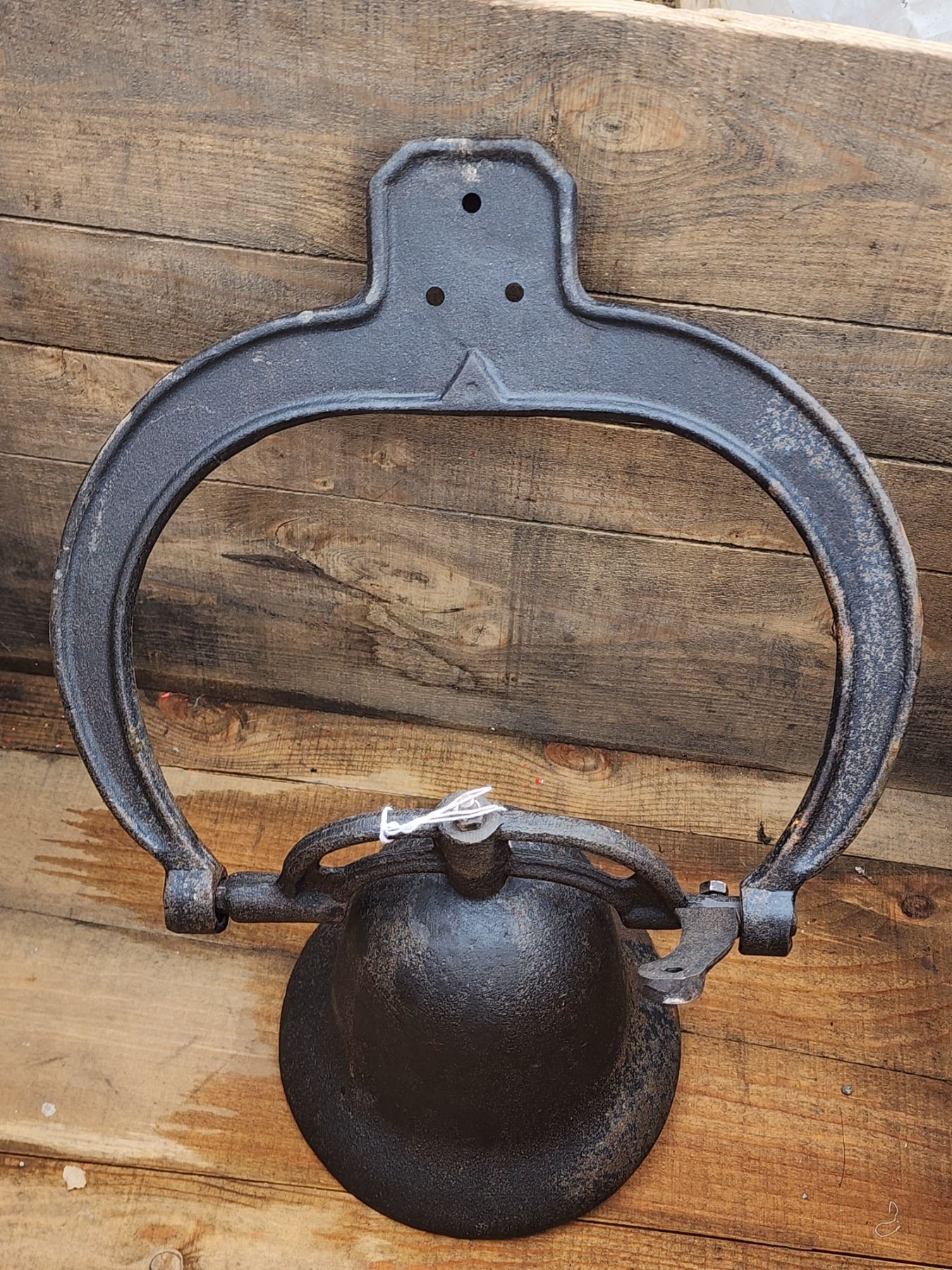 Cast iron bell, w/ holder - Schmalz Auctions