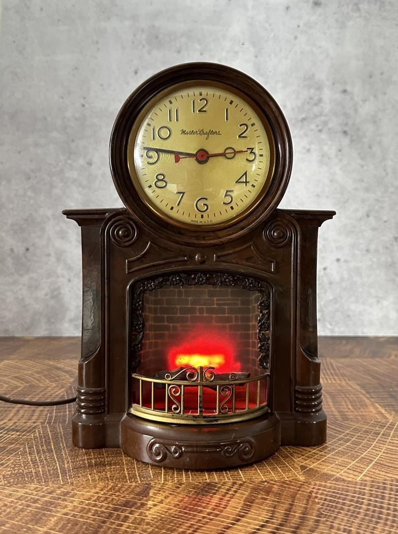 Mastercrafters Lighted Motion Fireplace Clock