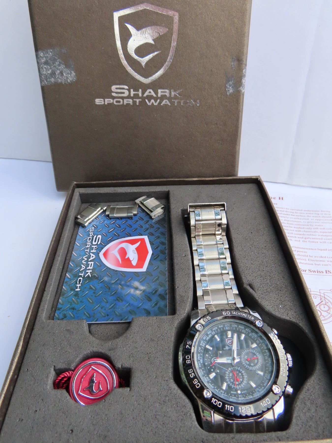 SHARK Sport Watch. Appears new and works! Box has some tape marks on it.