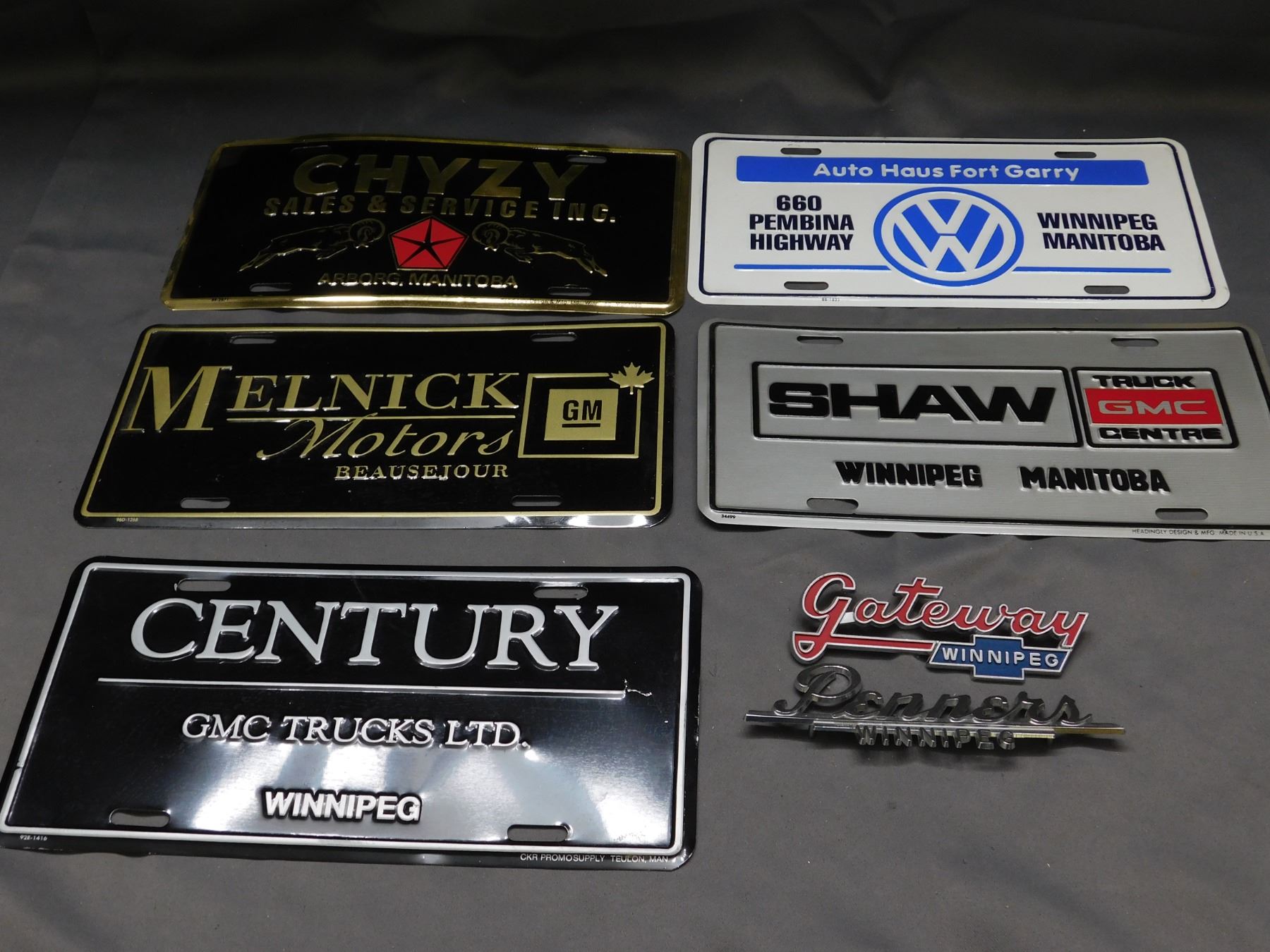 7pcs Dealer Plates Dealerships Winnipeg, Manitoba & 2 Dealer Emblems