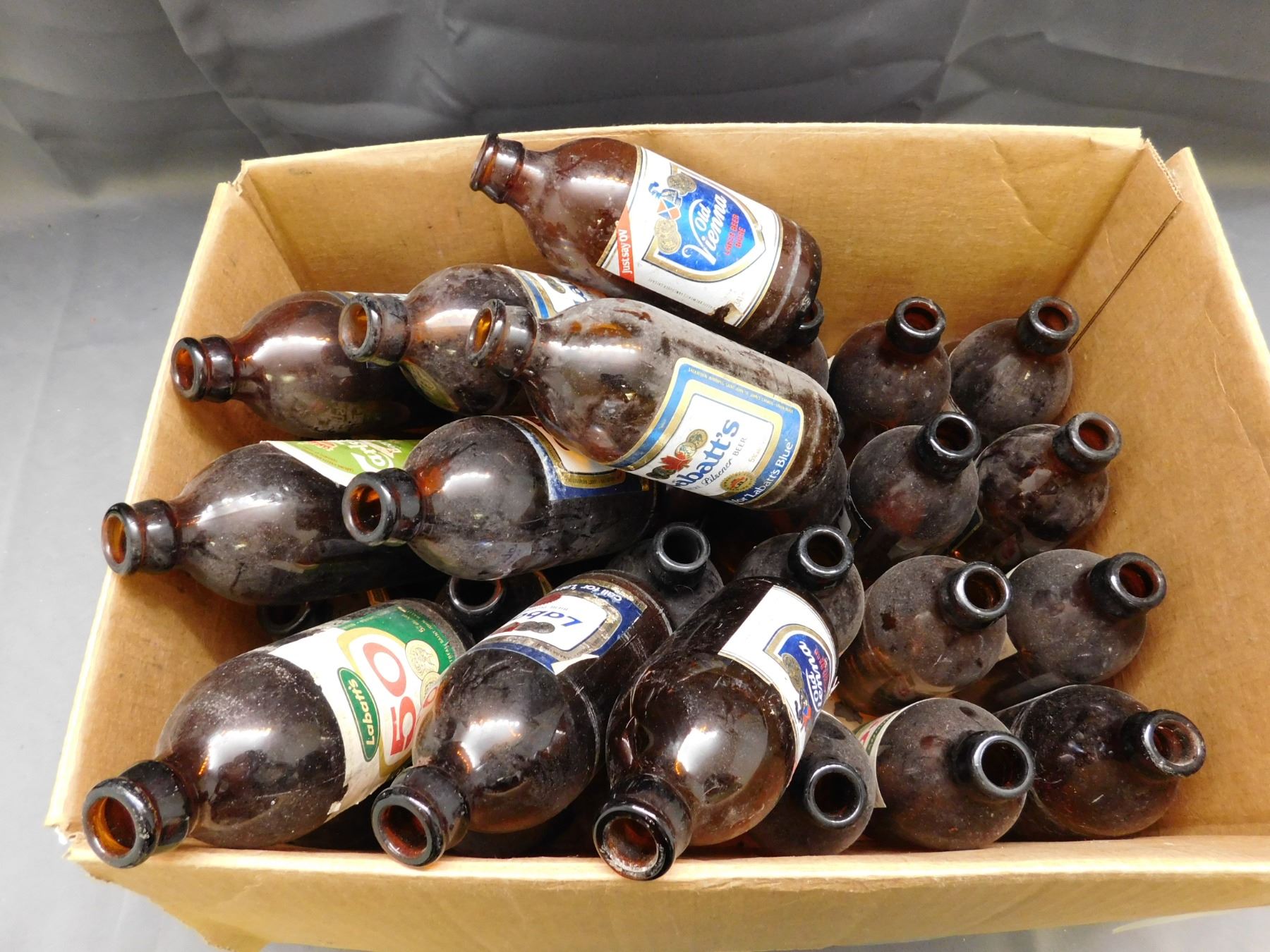 Large Box of Vintage Stubby Beer Bottles
