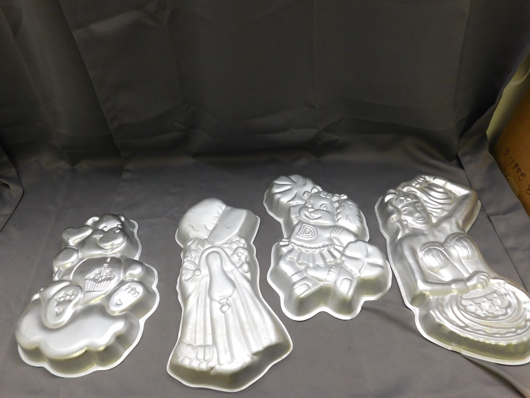 Lot of 4 1970s 80s Wilton Character Cake Pans Wonder Woman, Care Bears, Etc