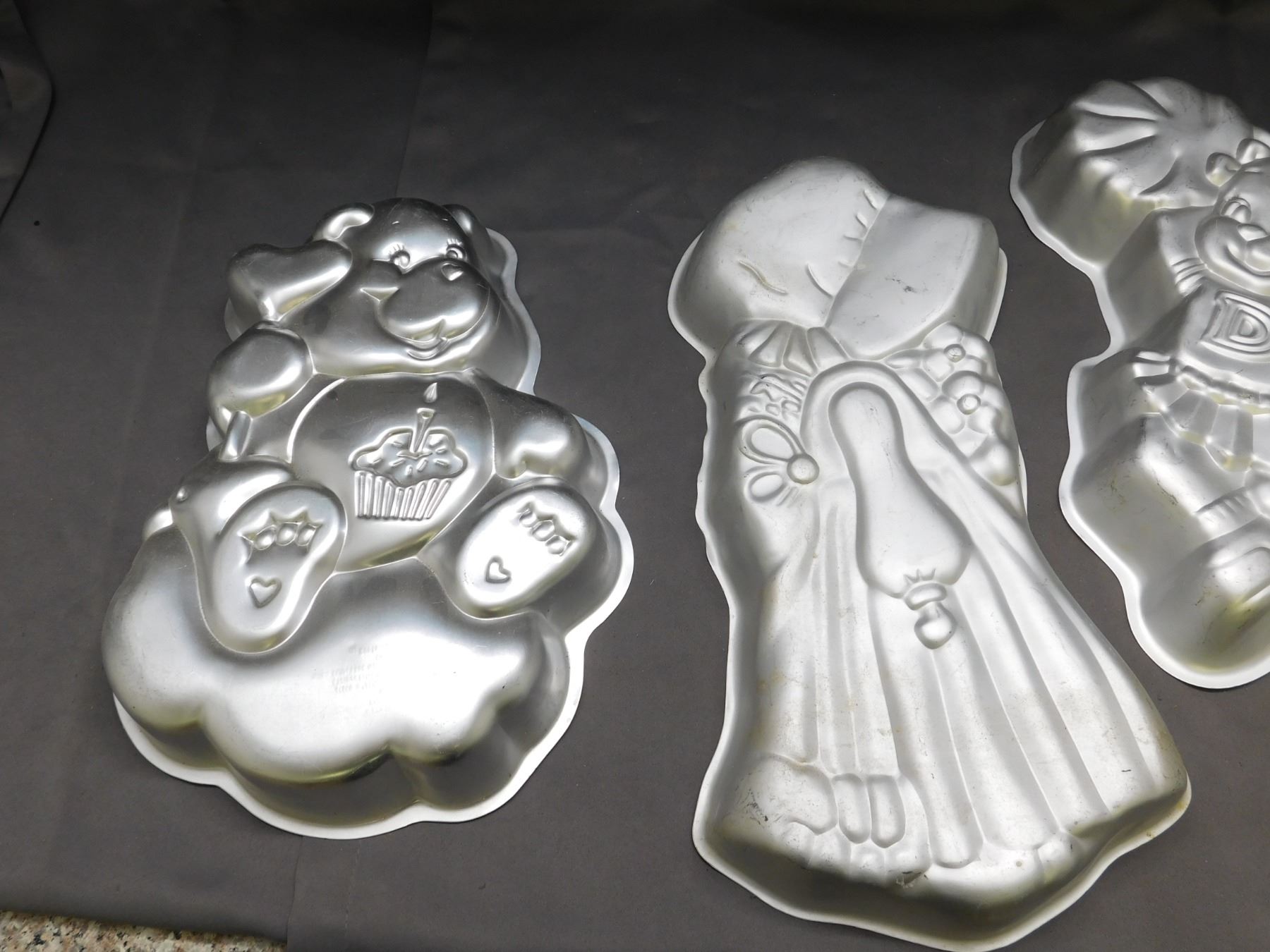 Lot of 4 1970s 80s Wilton Character Cake Pans Wonder Woman, Care Bears, Etc
