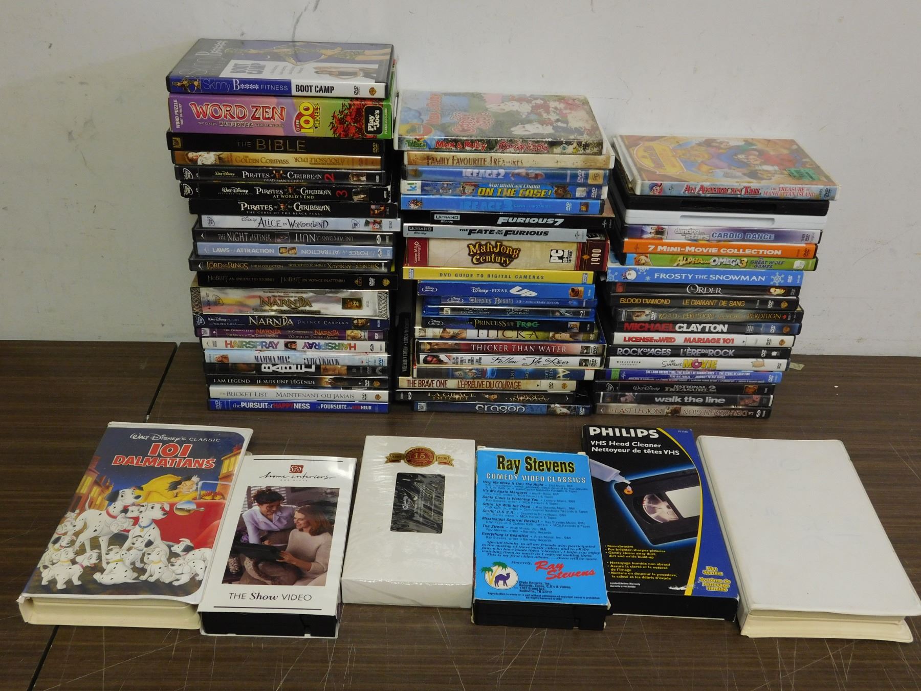 Lot of 65 Mostly DVDs some VHS Movies Assorted Genres POTC, LOTR, Etc