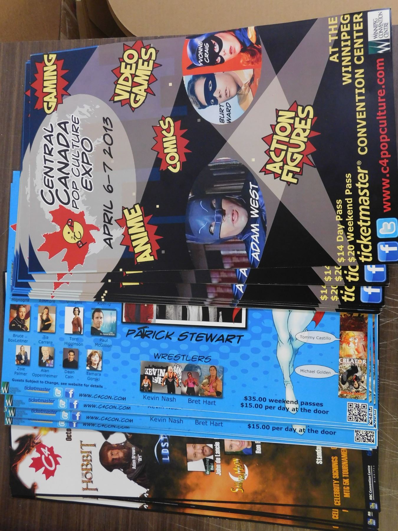 Stack of C4 Central Canada Comic Con Winnipeg Posters