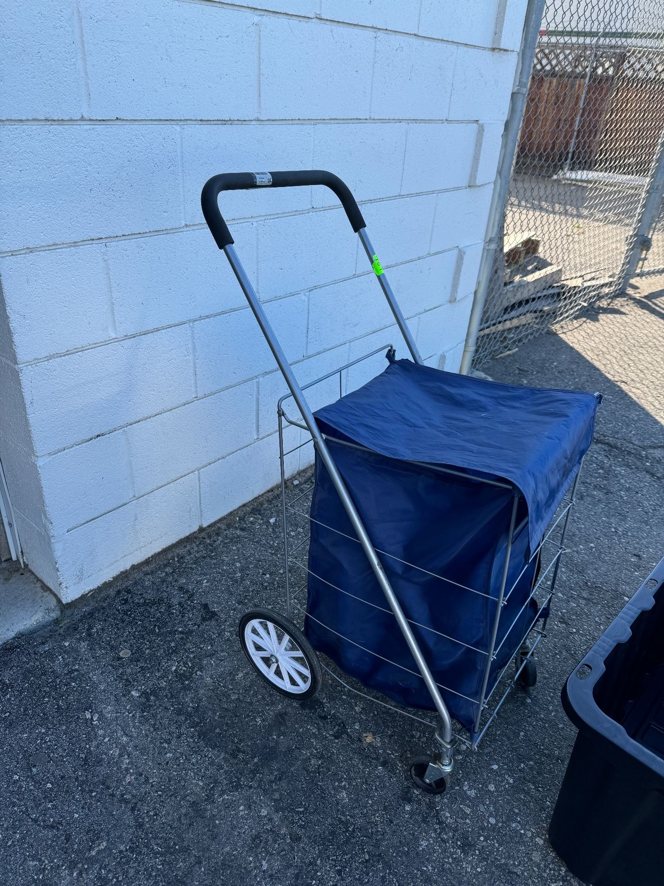 Folding wheeled cart