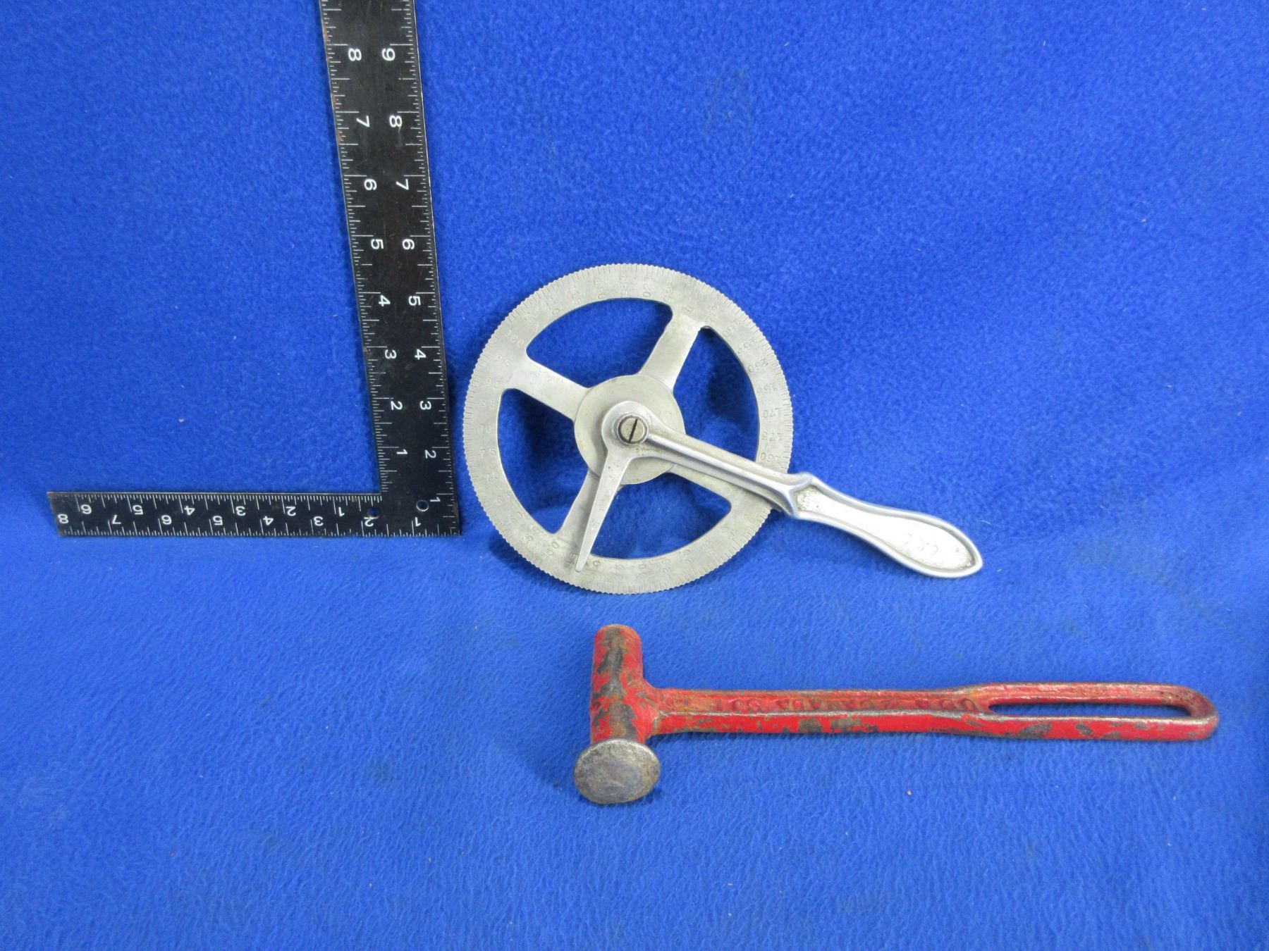 Vintage Wheel Measuring Tool and a Hammer