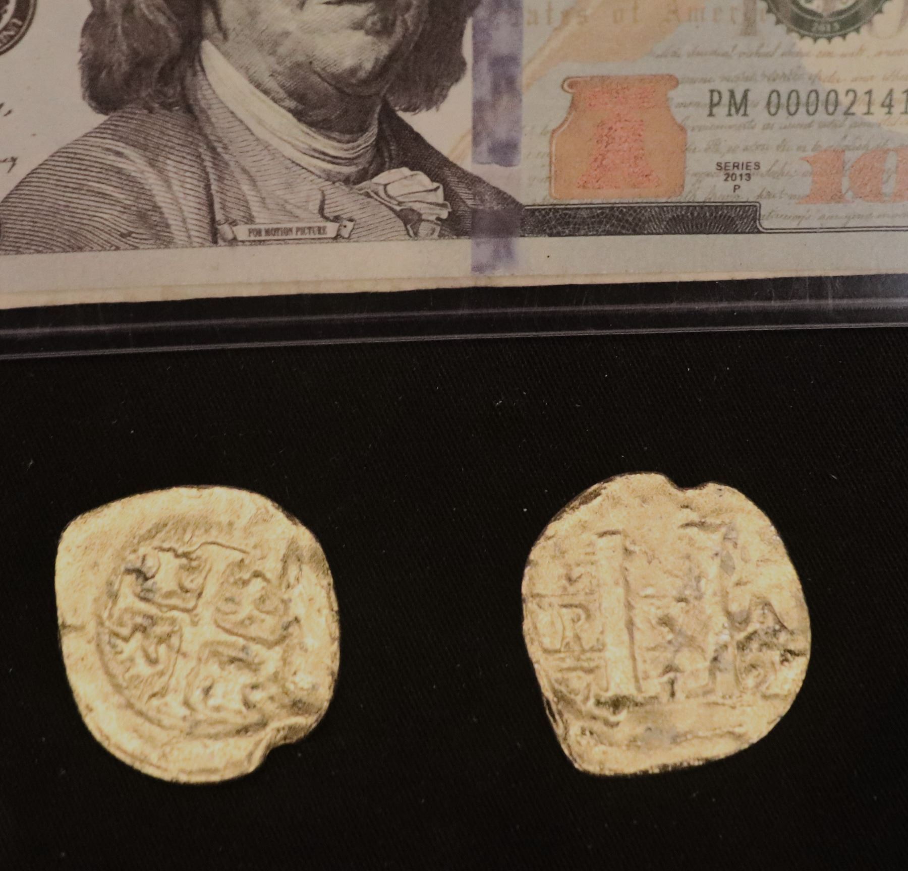 GOONIES THE ONE-EYED WILLY'S GOLD COIN SCREEN USED METAL HERO A