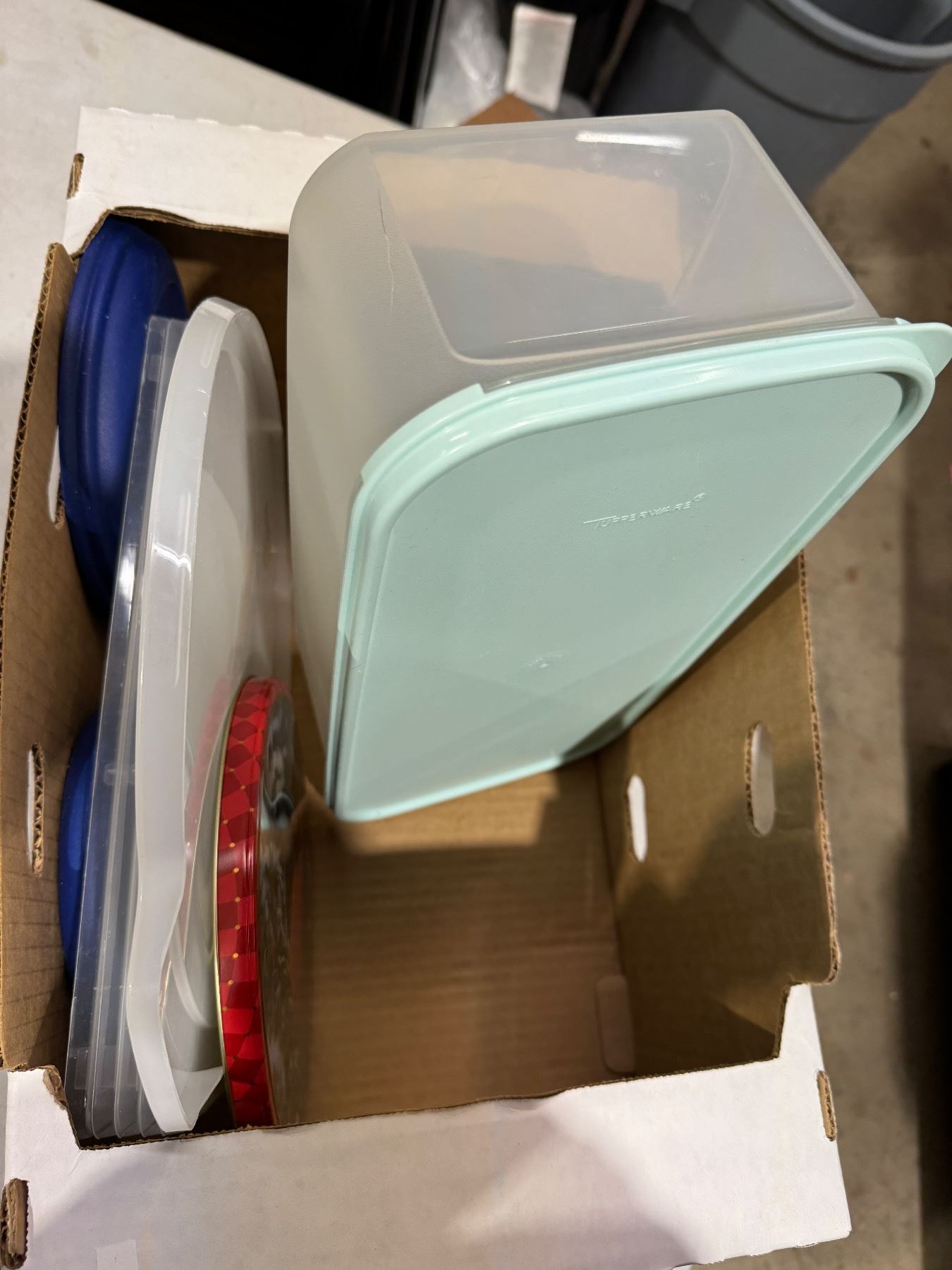 Tupperware bin and assorted lids