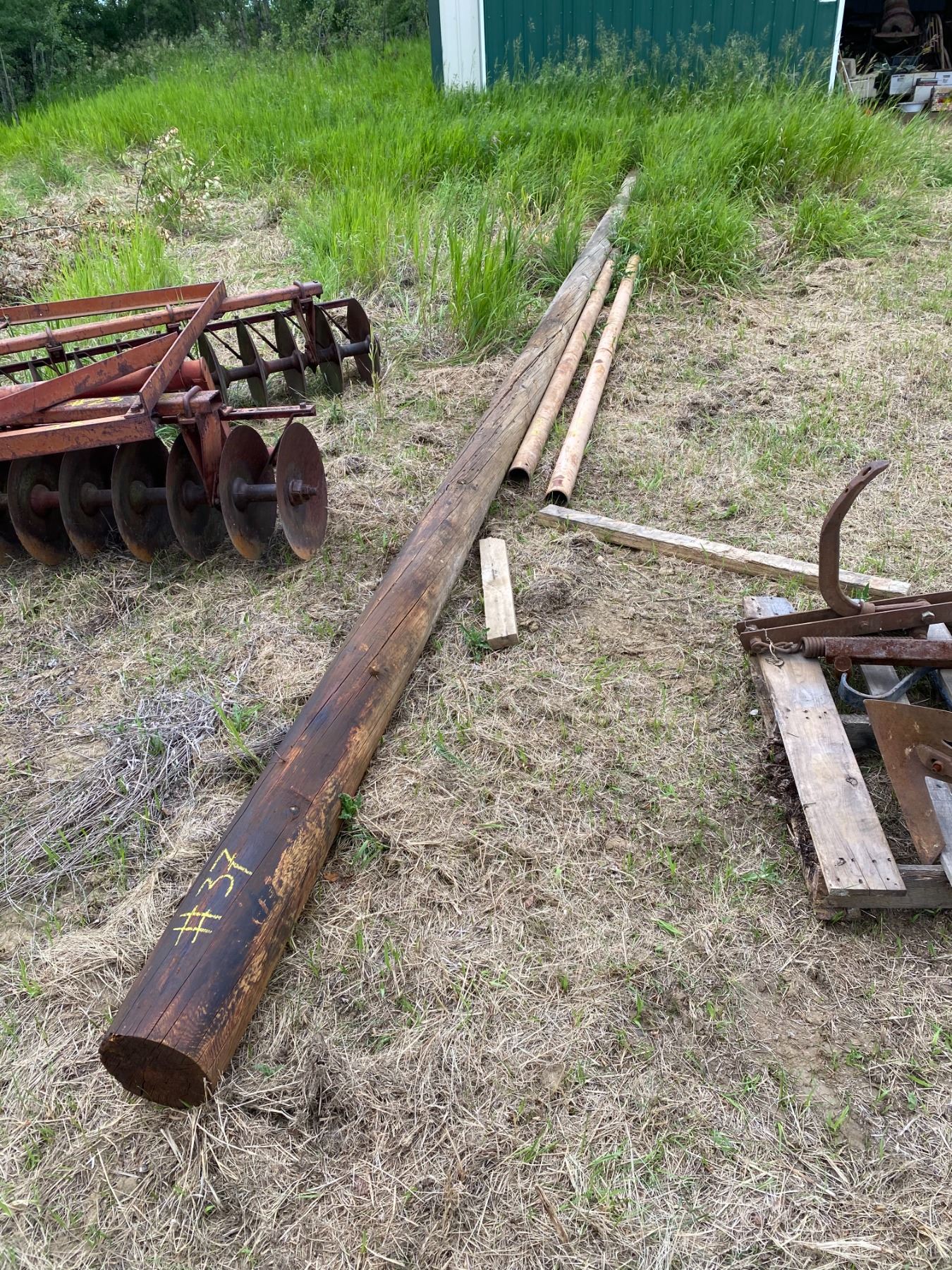 Power pole & 2- 3 1/2 inch pipes