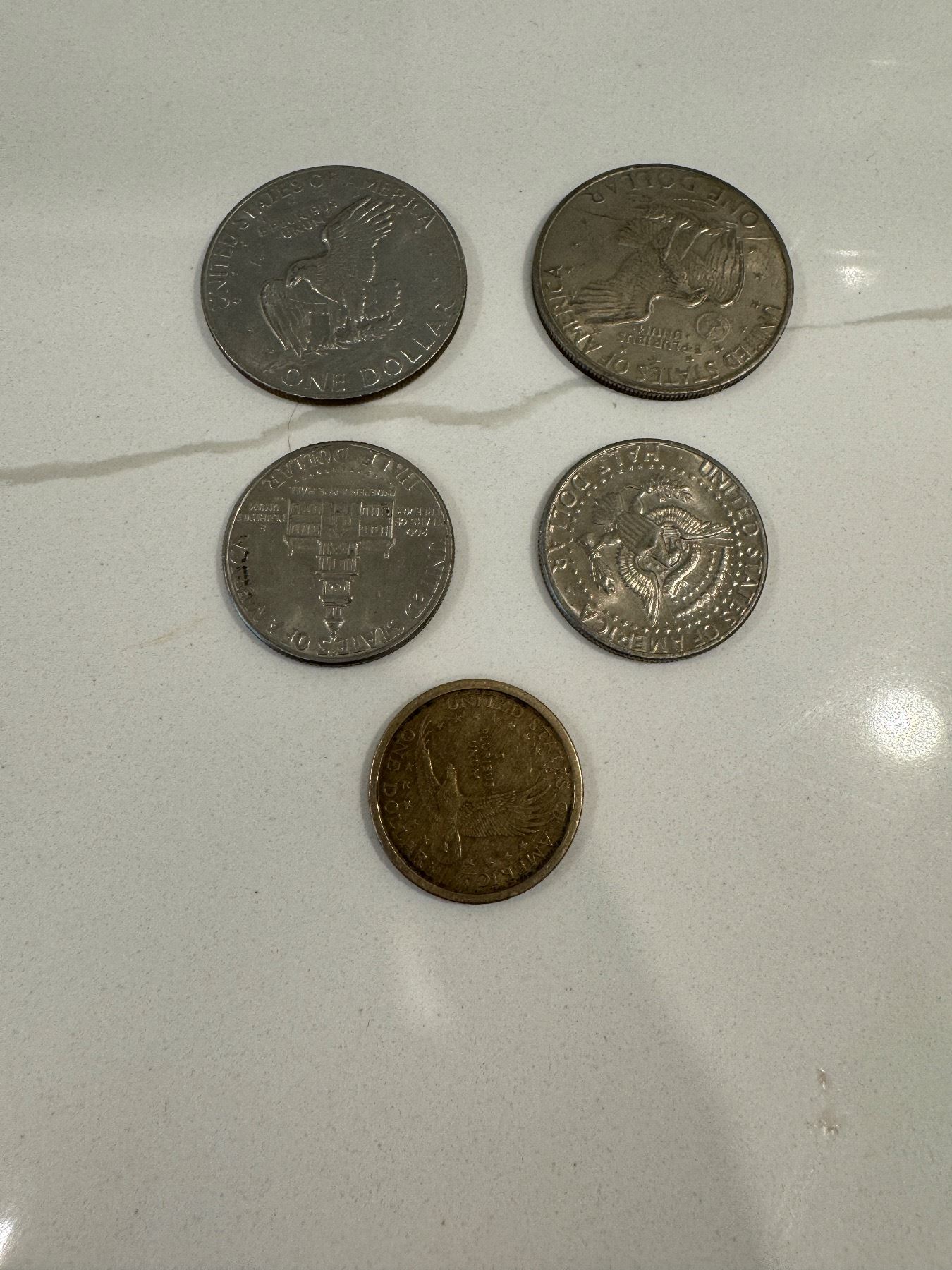 3x U SA $1 coins, 2x half dollars