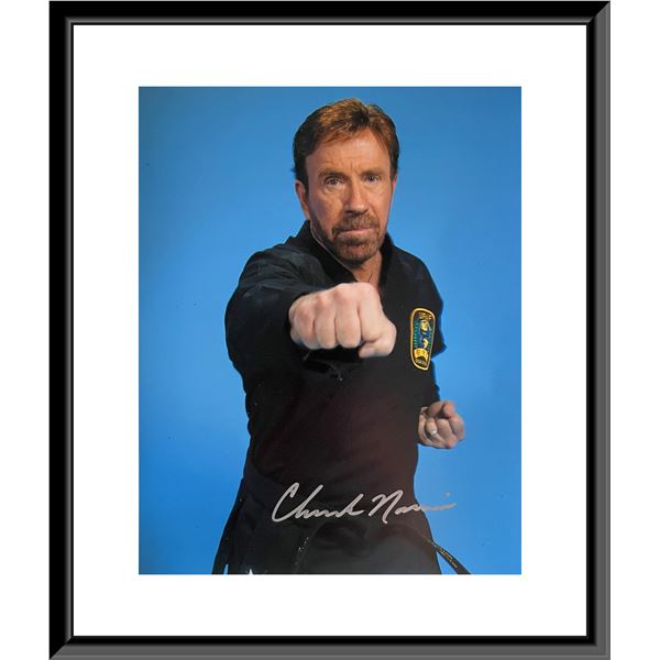 Chuck Norris signed photo. GFA Authenticated