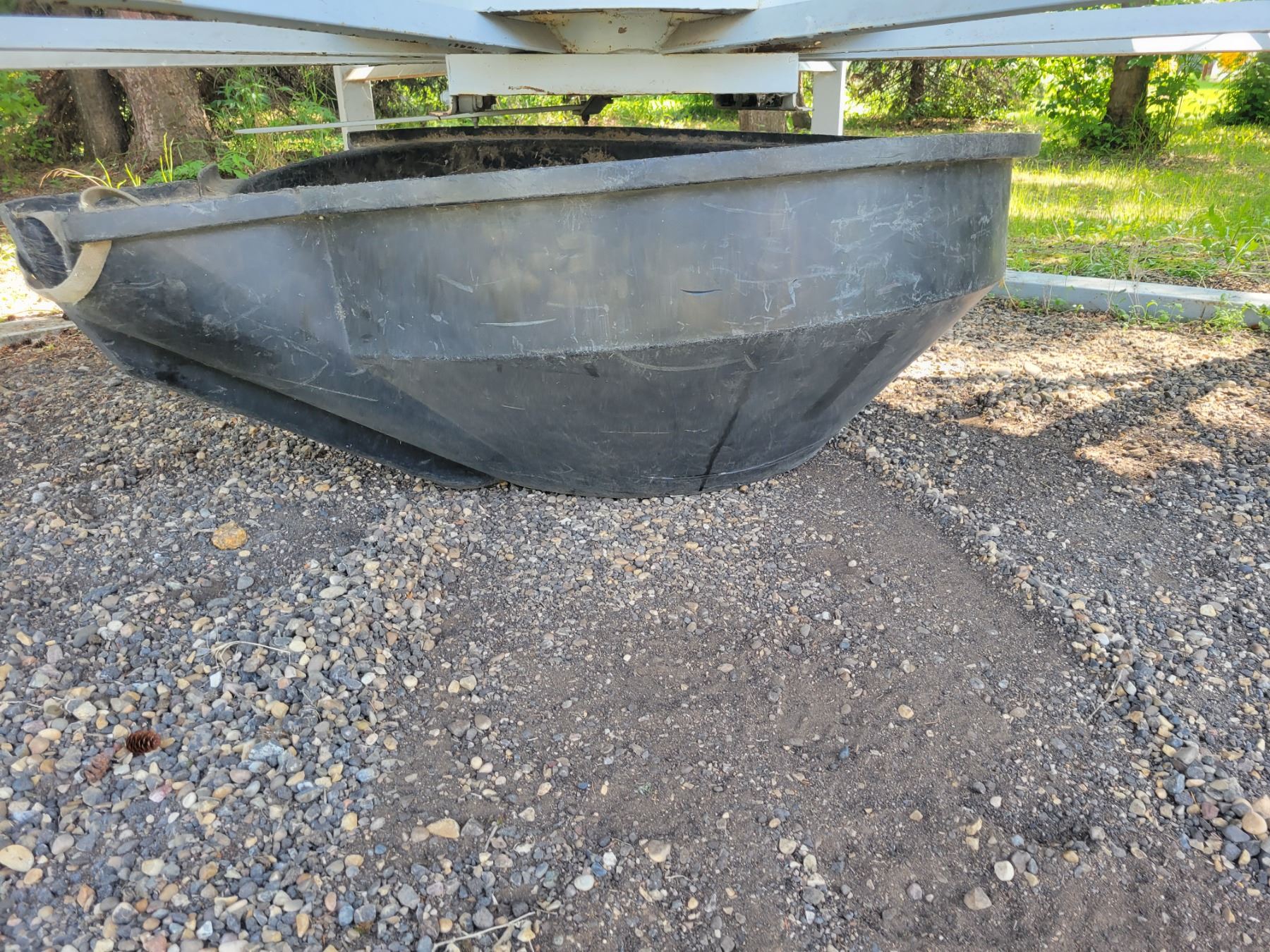 Round black plastic auger hopper