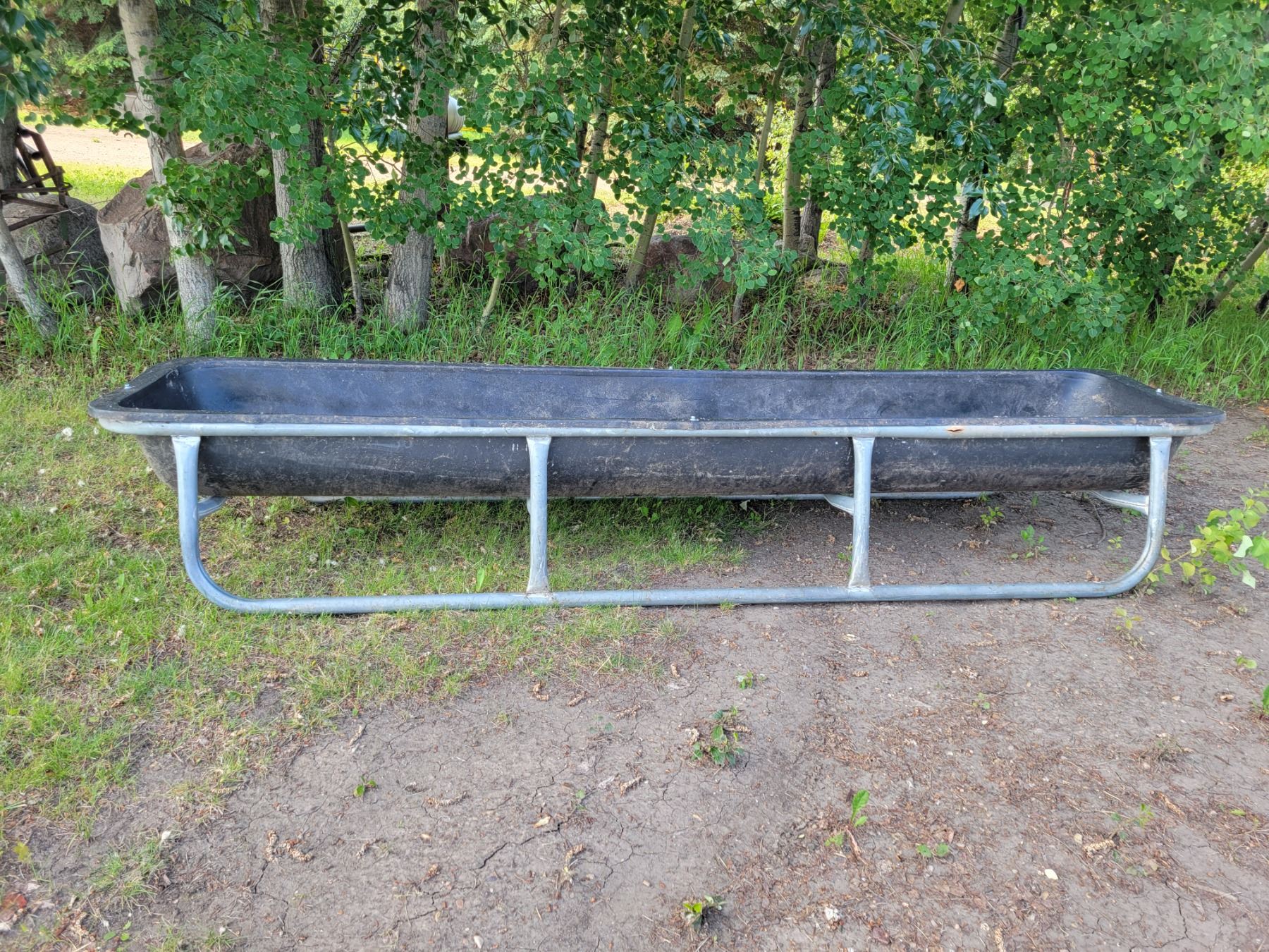 Approx. 10 ft plastic feed bunk