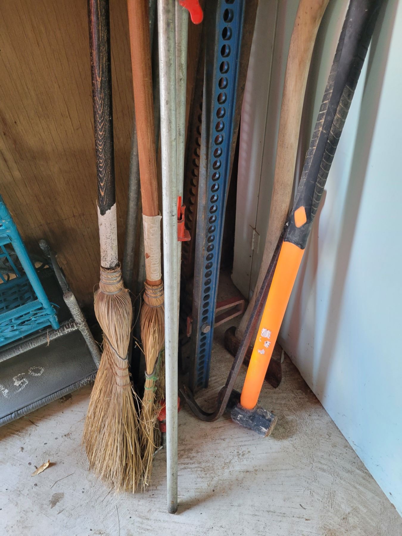 Sledge hammer, brooms, wood clamps, axe, crow bar, jackall