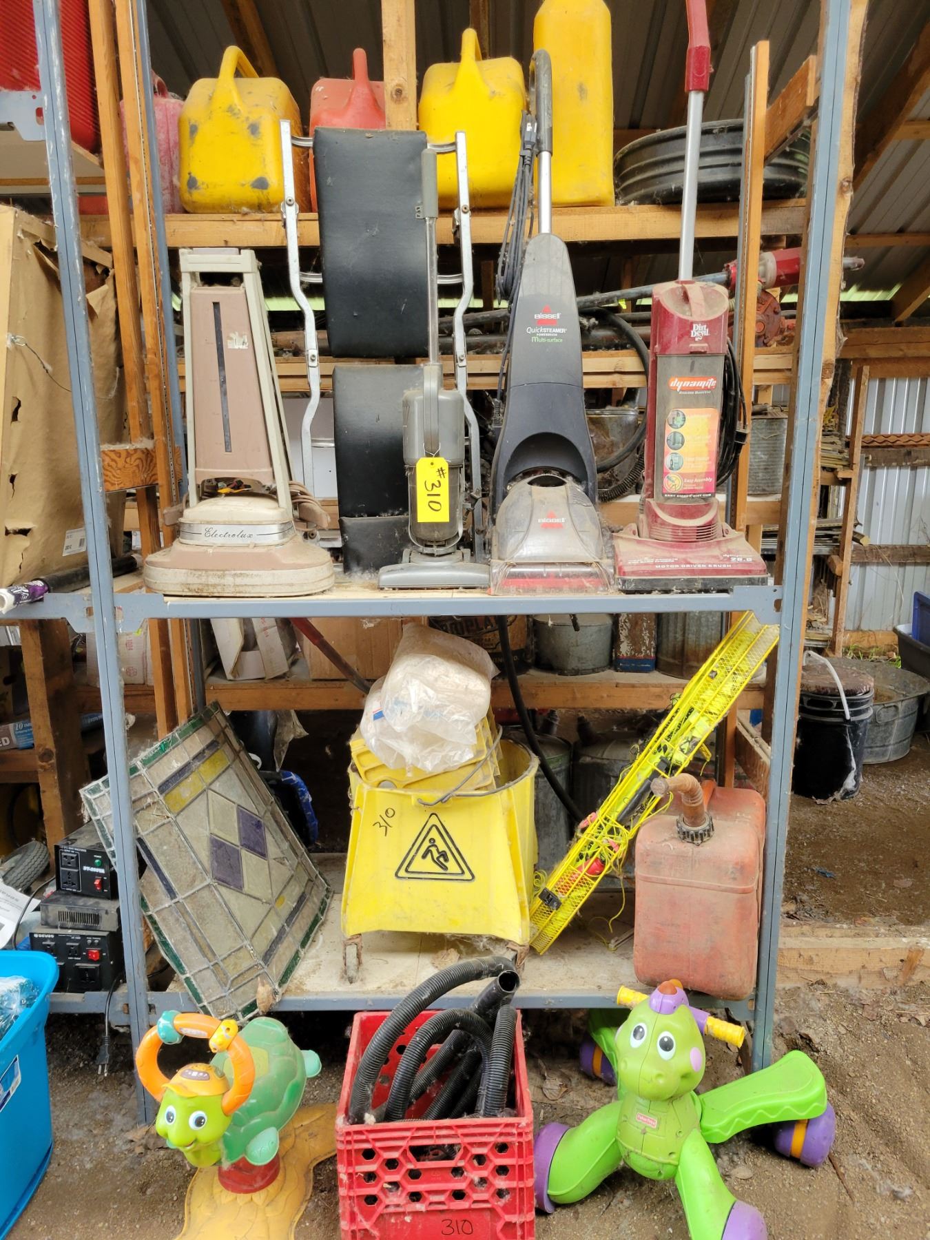 4- Vacuums, hose, kids items, stained glass, mop pail, jerry can etc.