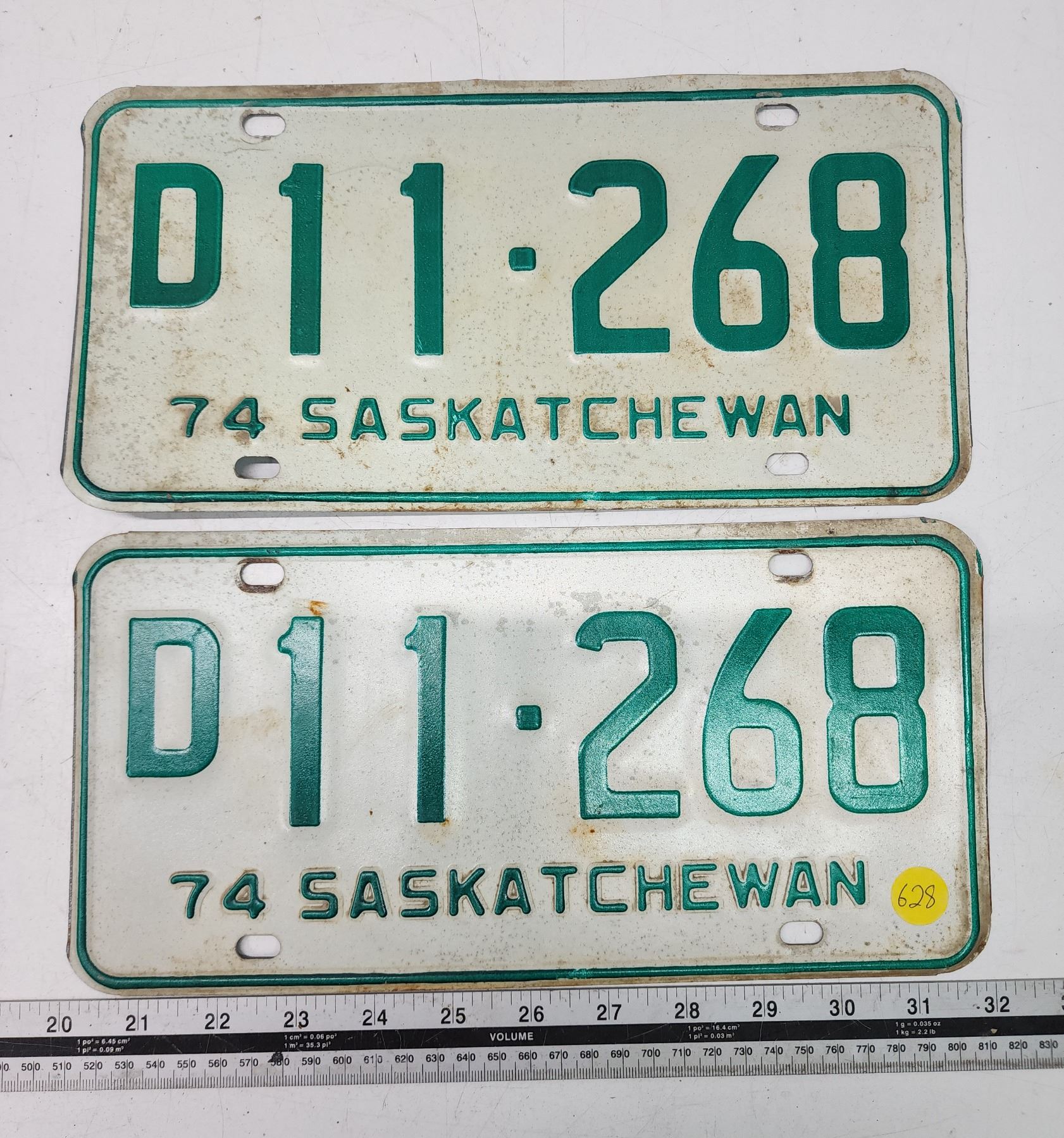 Pair of 1974 Saskatchewan license plates - D 11-168 - Schmalz Auctions