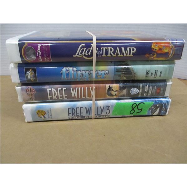 ESTATE: 4 VHS MOVIES (2 - FREE WILLY, FLIPPER, LADY & THE TRAMP)