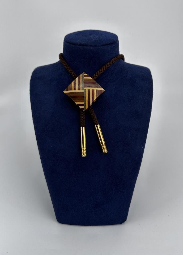 Vintage Inaid Wood Bolo Tie