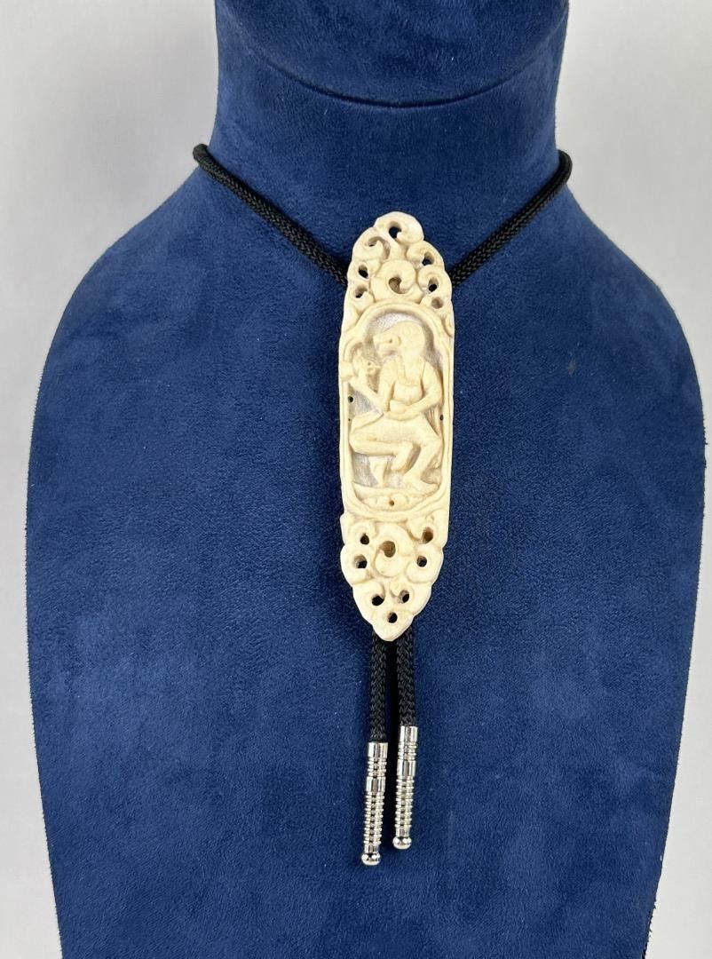 Carved Bone Bolo Tie