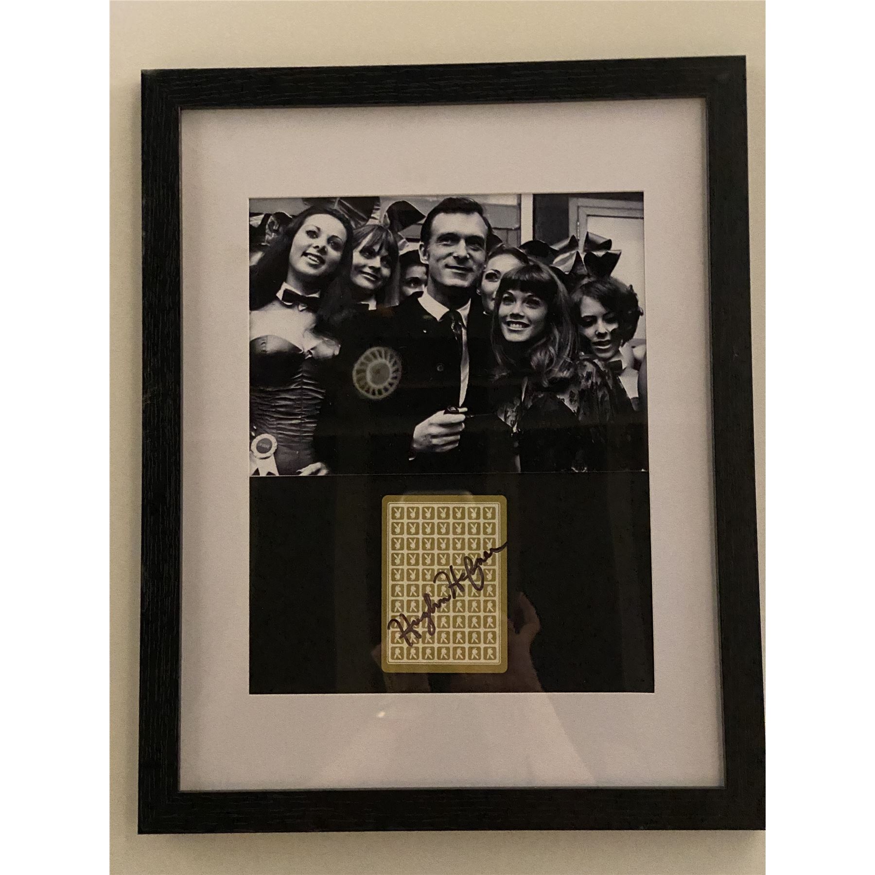 Hugh Hefner signed playing card. GFA authenticated