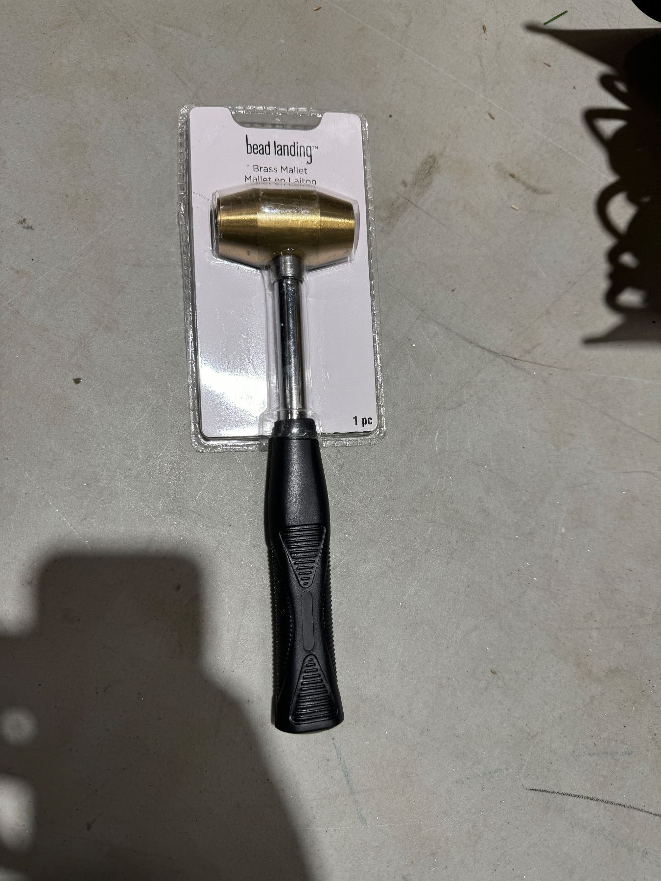 Bead landing, brass mallet