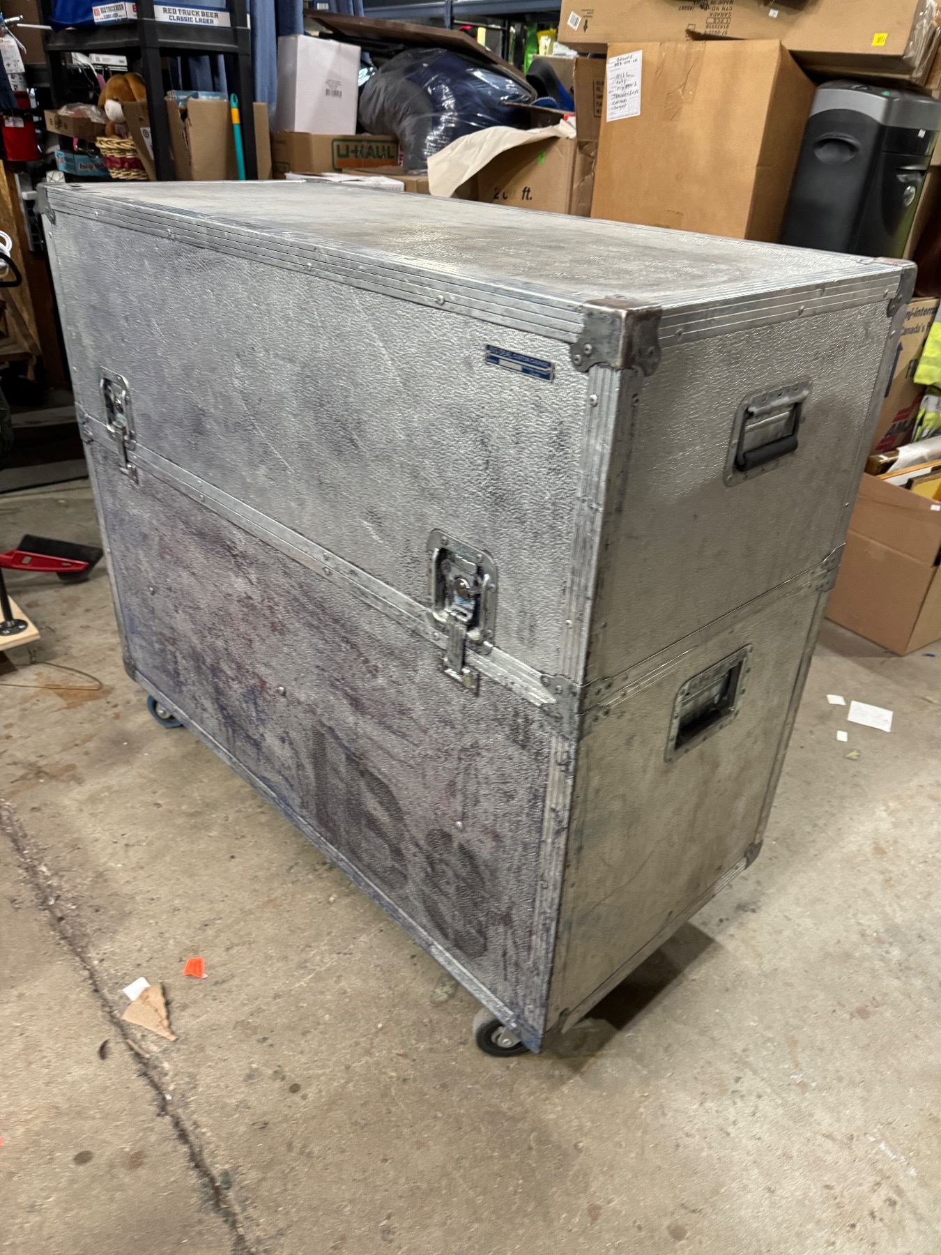 Storage container on casters 49 1/4 long 22 1/2 wide 44 inches tall