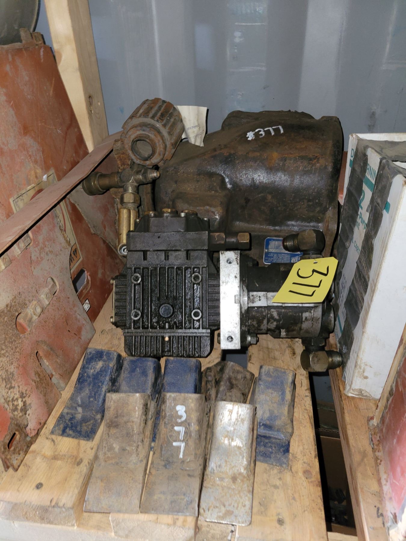 R-100 transmission housing, hoe teeth and hydraulic triplex pump