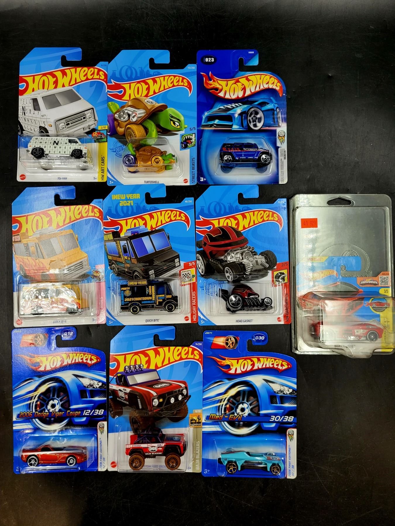 10 Sealed Hot wheels Including Treasure Hunt Night Burner