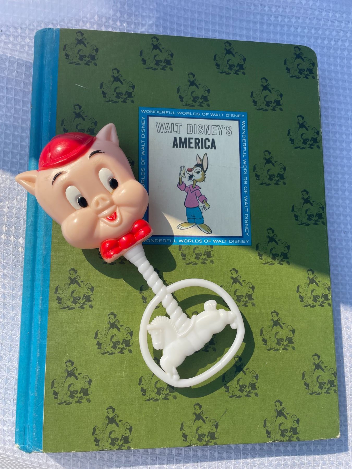 Book "Walt Disney's America" and Porky Baby Rattle
