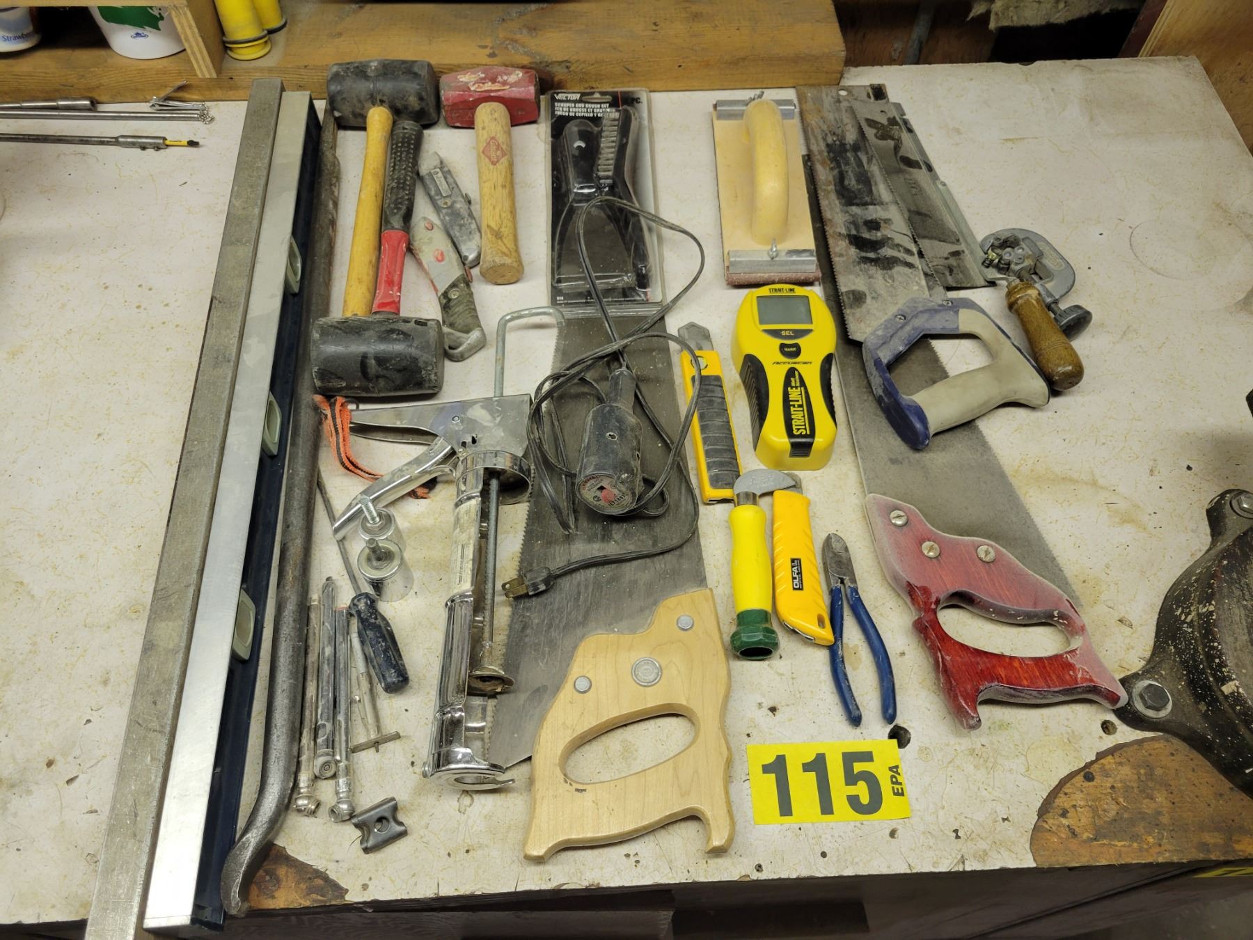 2 levels, rubber hammer, handsaw,silicon gun, handsander, knives, brush ...