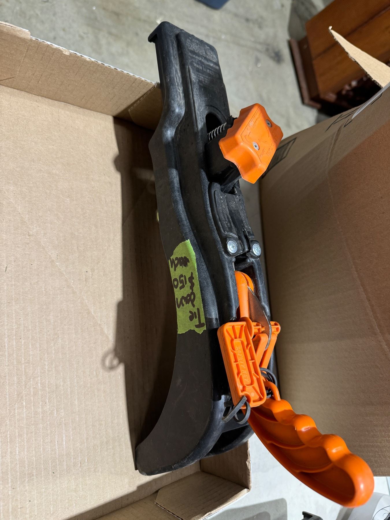 Snowmobile, clamp tiedown