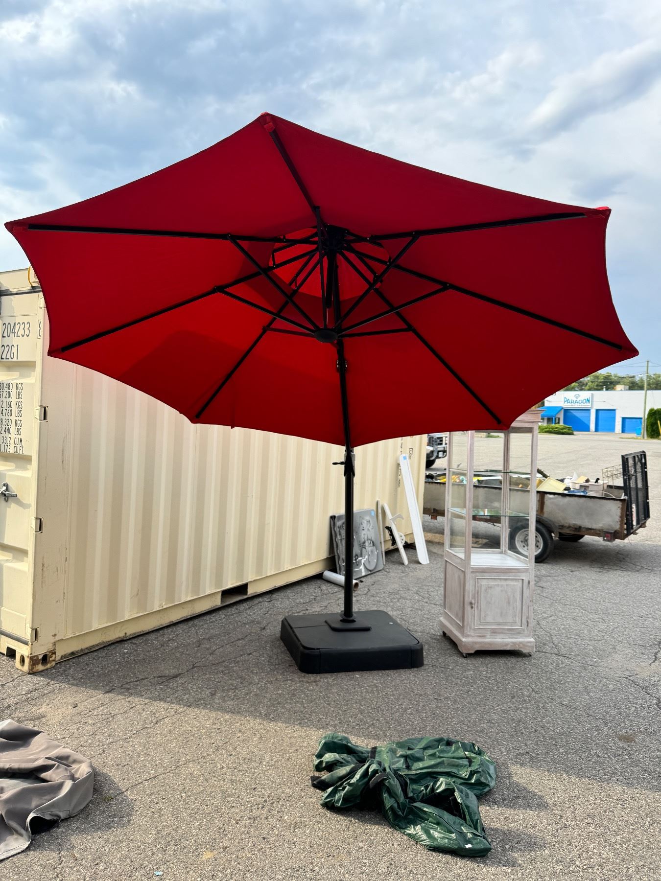 Patio umbrella and stand with cover