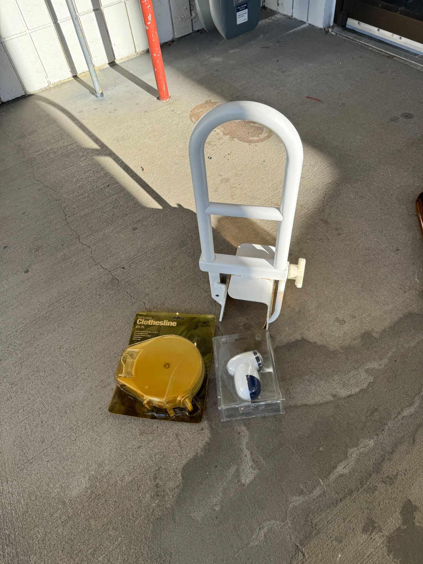 Bath safety handle.clothes line and lint remover