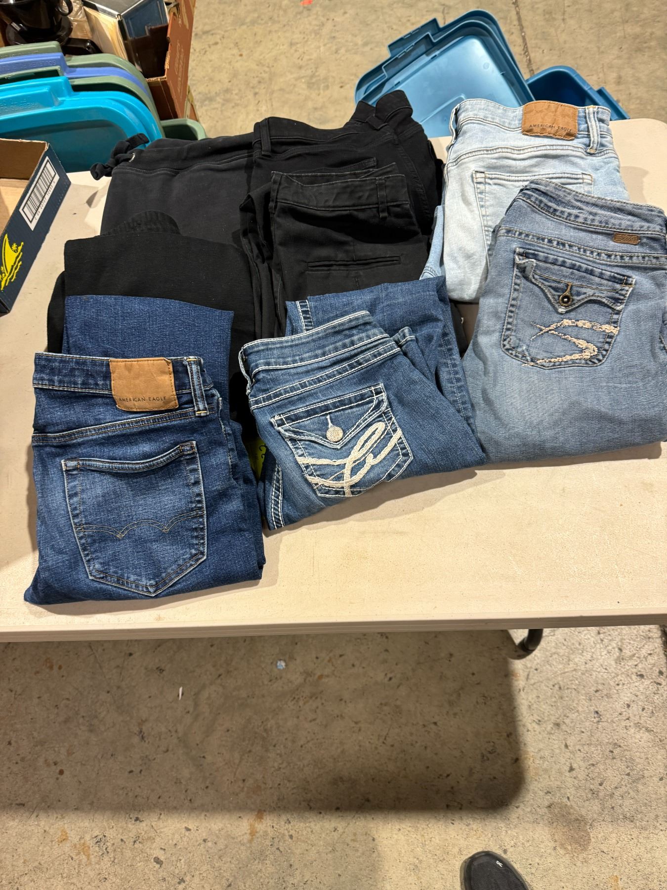 Assorted jeans and sweatpants, etc.
